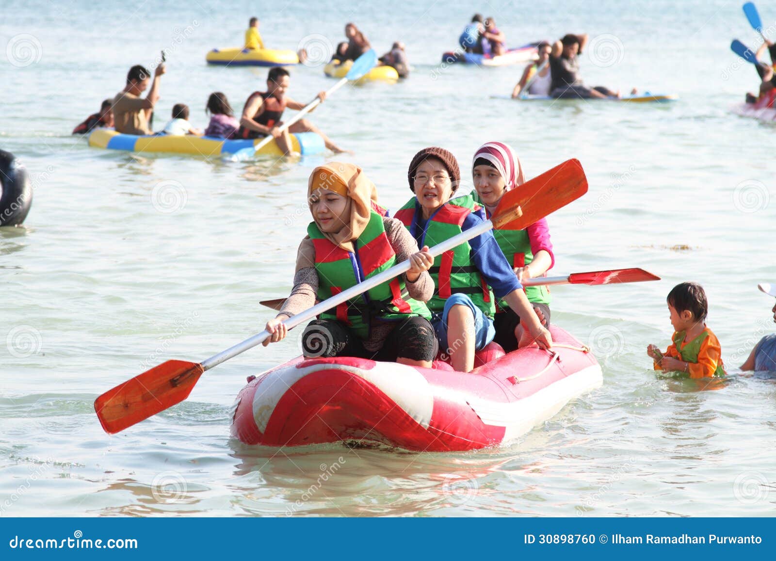 Playing Paddle Raft editorial image. Image of holiday - 30898760