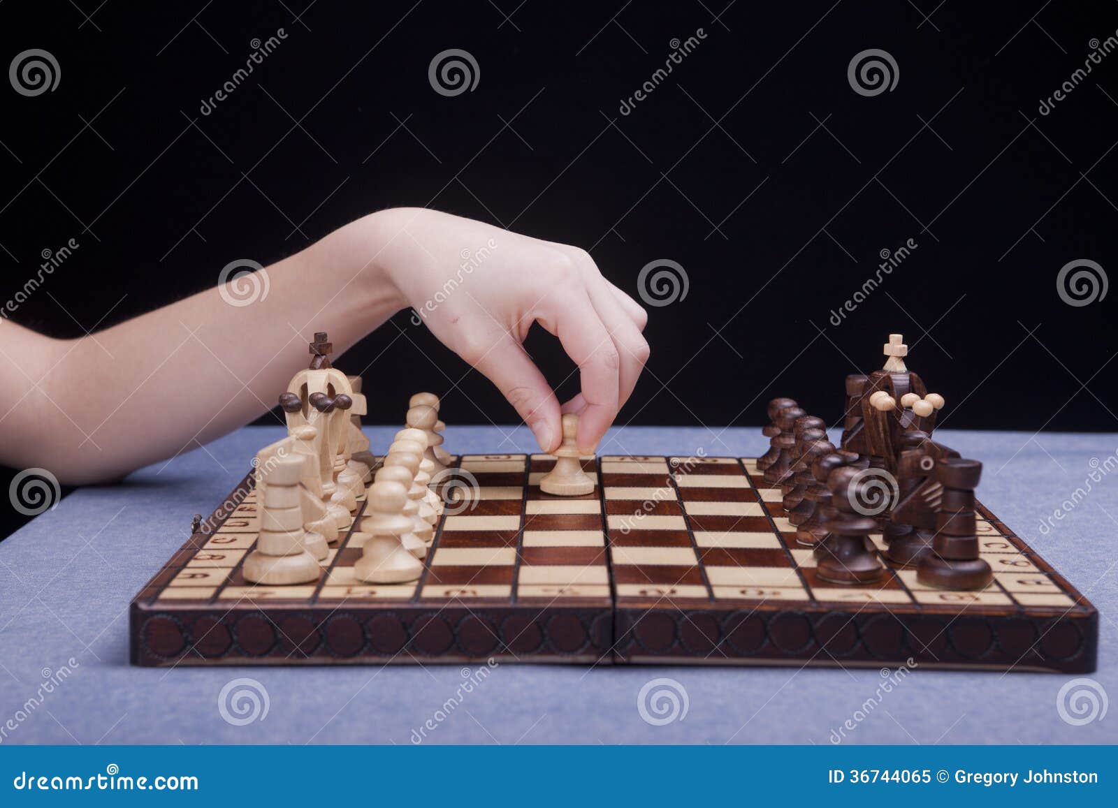 Playing the pawn first. stock image. Image of girl, strategy - 36744065