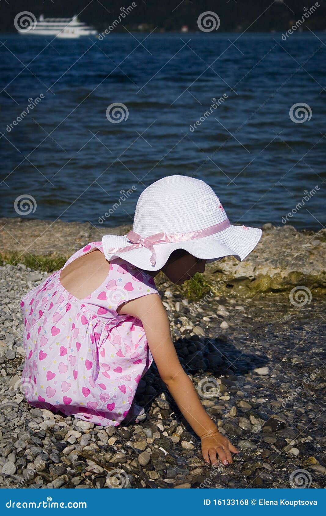 Playing with pebbles stock photo. Image of happy, lounge - 16133168