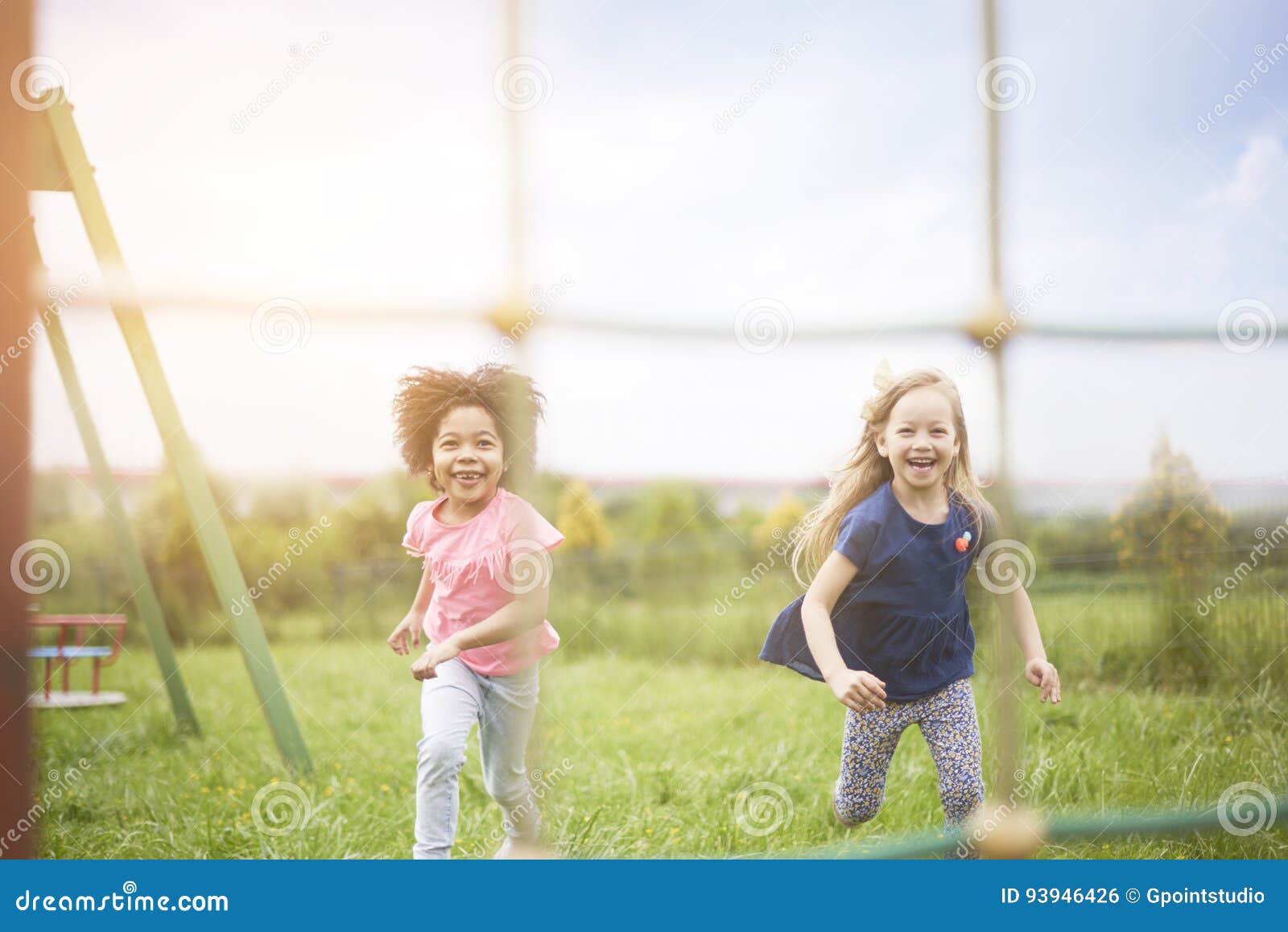 Playing on the playground stock photo. Image of innocence - 93946426