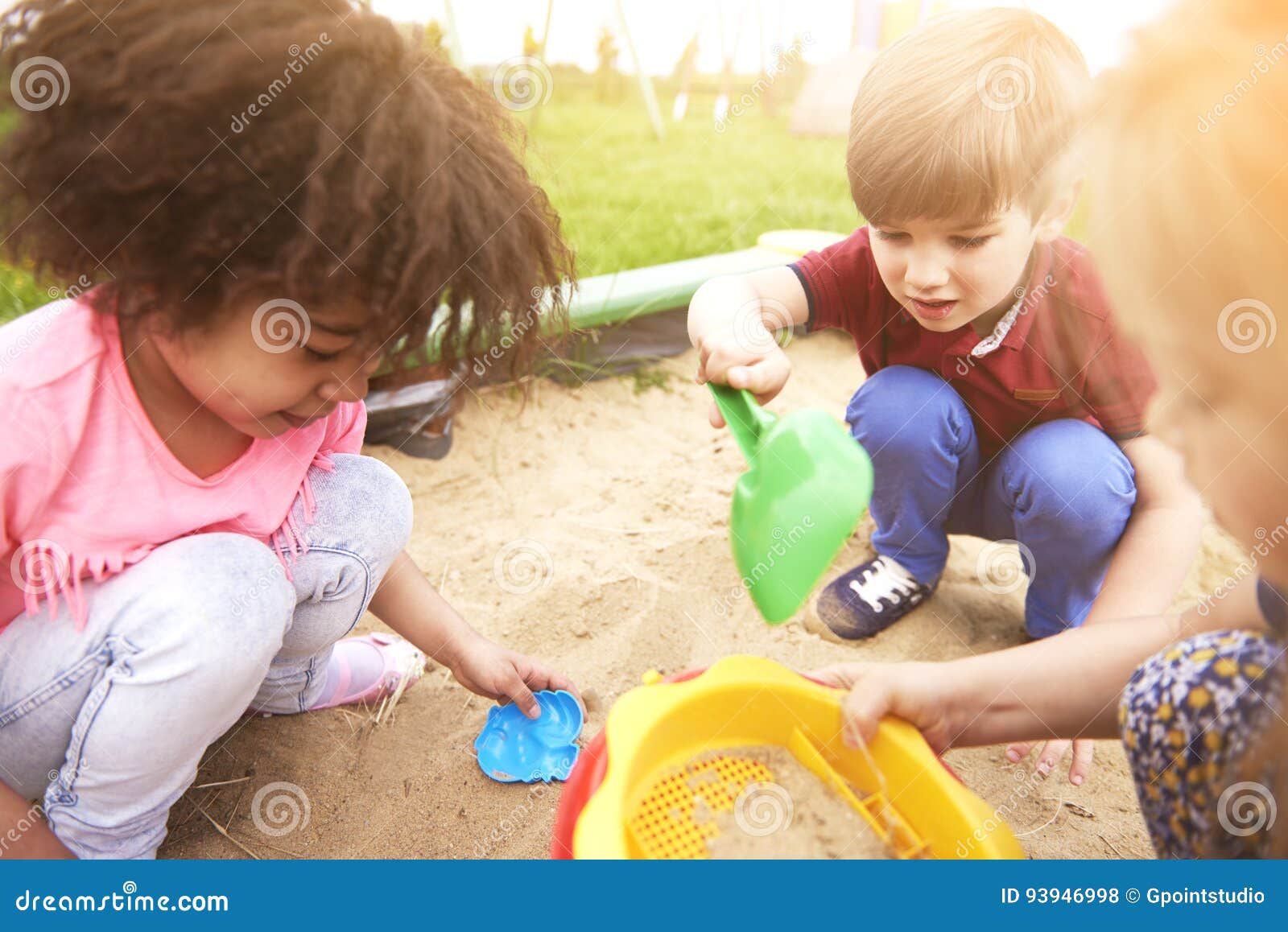 Playing on the playground stock photo. Image of crouching - 93946998