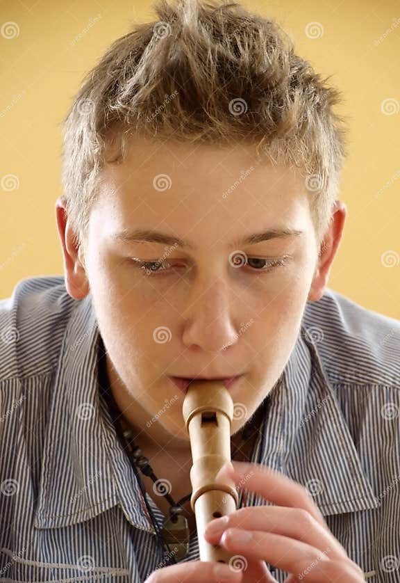 Playing the recorder stock image. Image of recorder, expression - 10817653