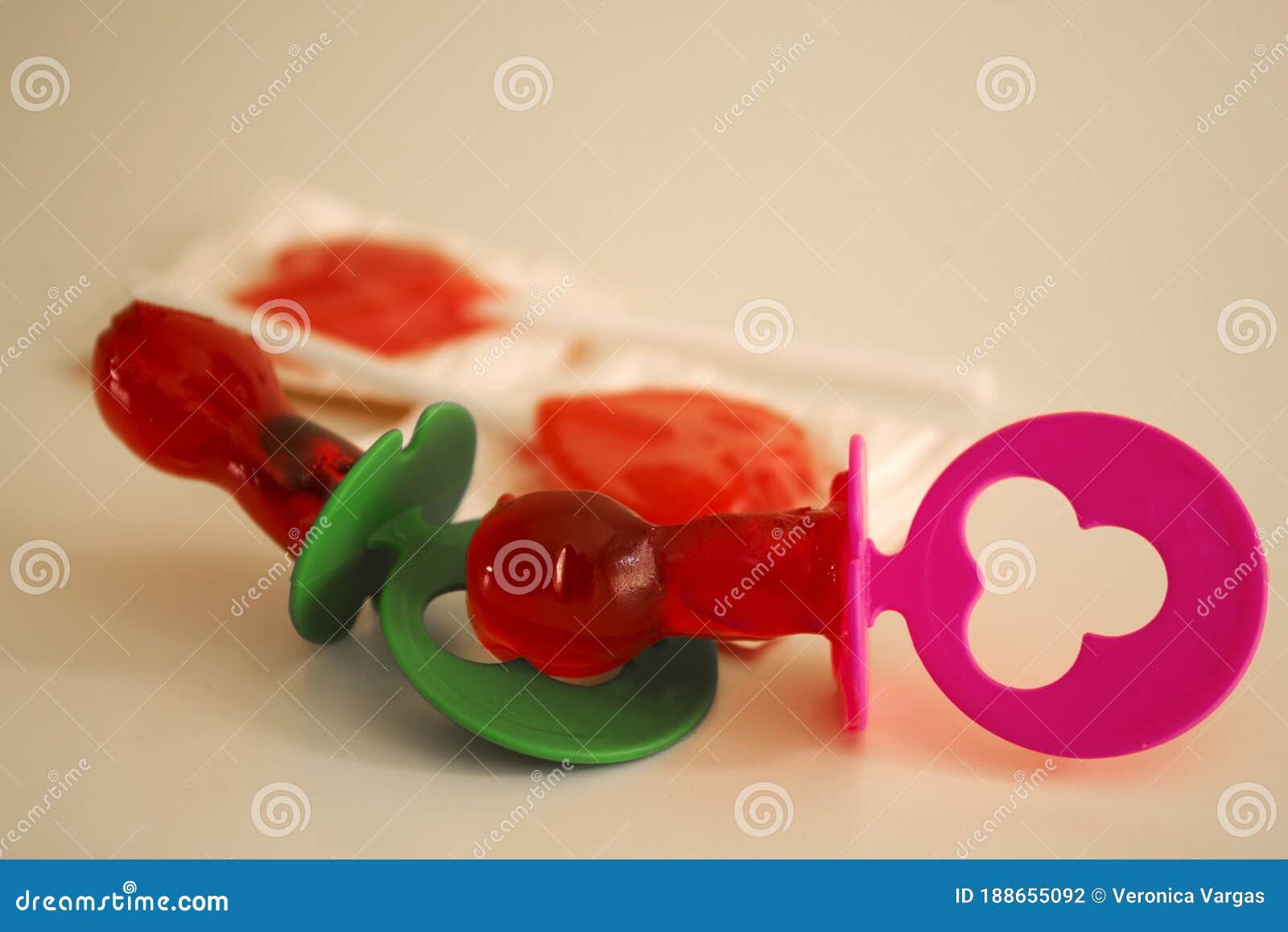 Playing with Lollipops and Caramel Pacifiers Stock Photo - Image of ...