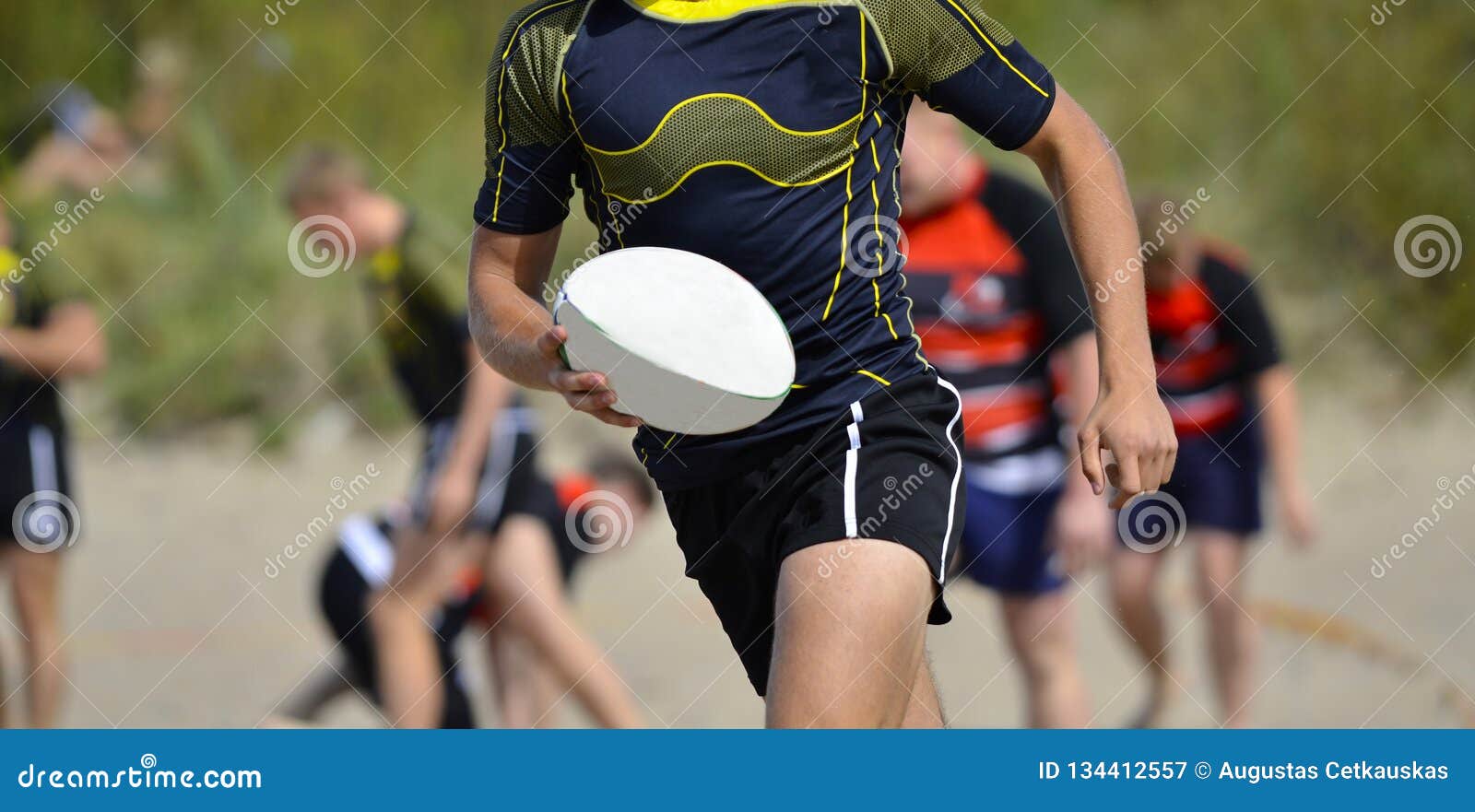 Playing Rugby at the Beach. Team Sport Stock Image - Image of play ...