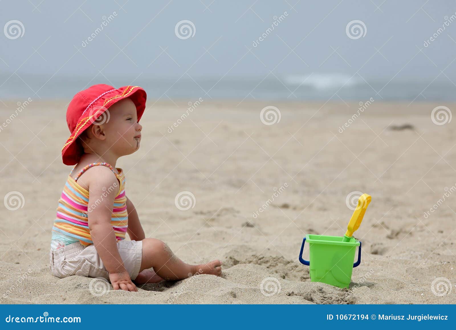 Playing on sand stock photo. Image of seaside, plastic - 10672194