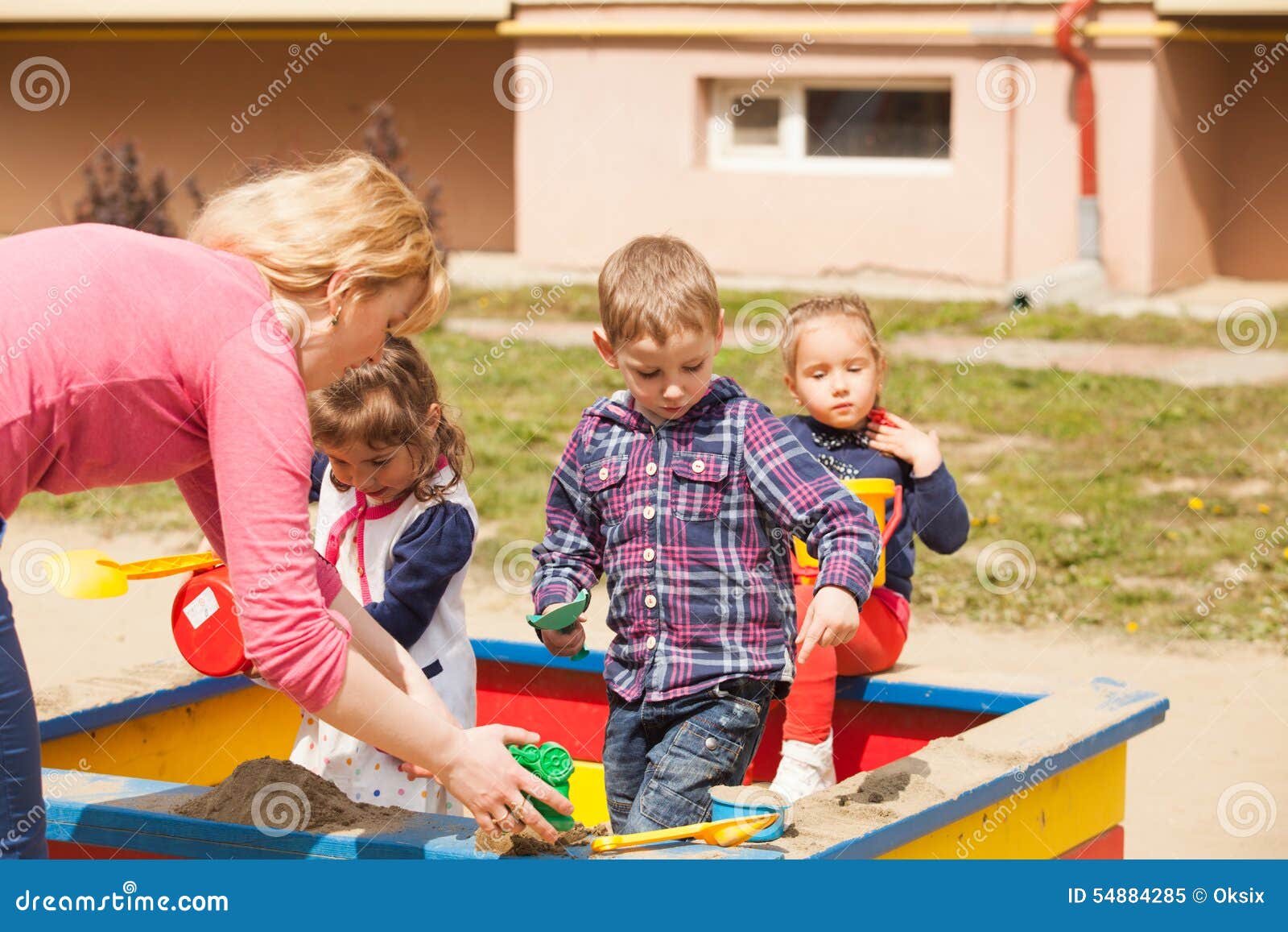 Playing in the sandbox stock image. Image of person, childhood - 54884285