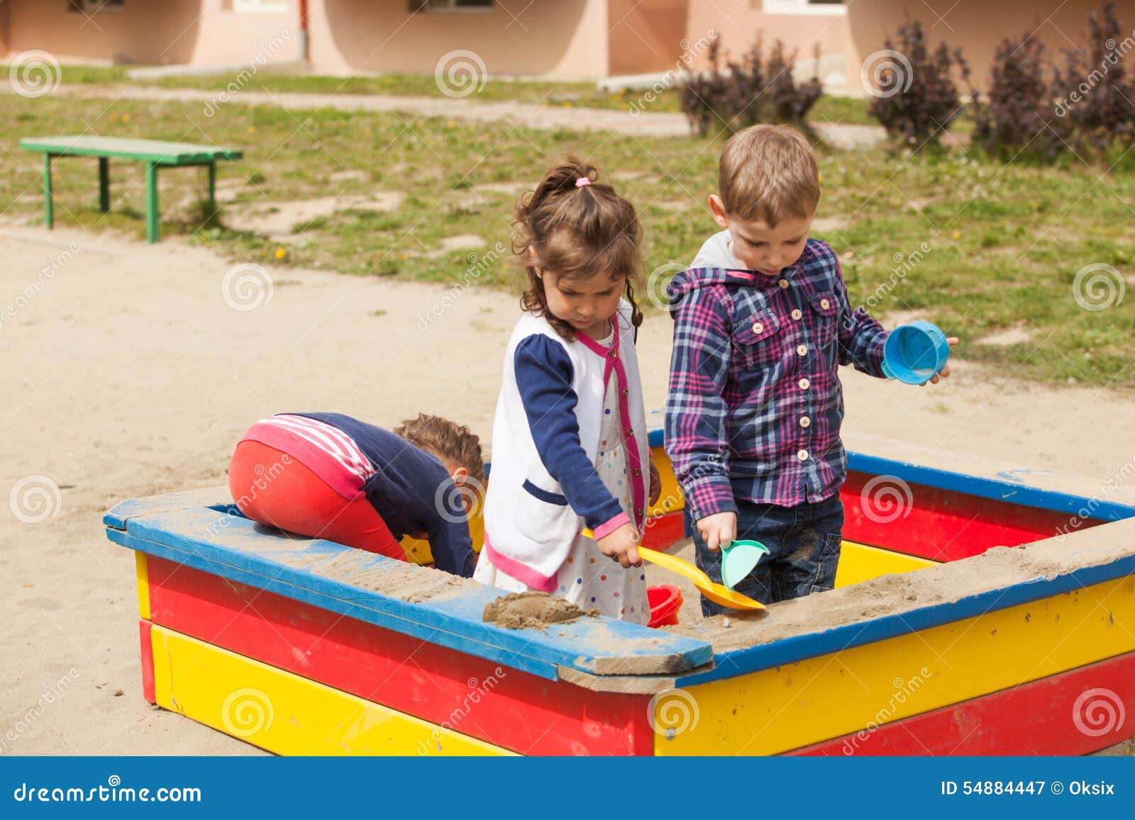 Playing in the sandbox stock image. Image of little, preschool - 54884447