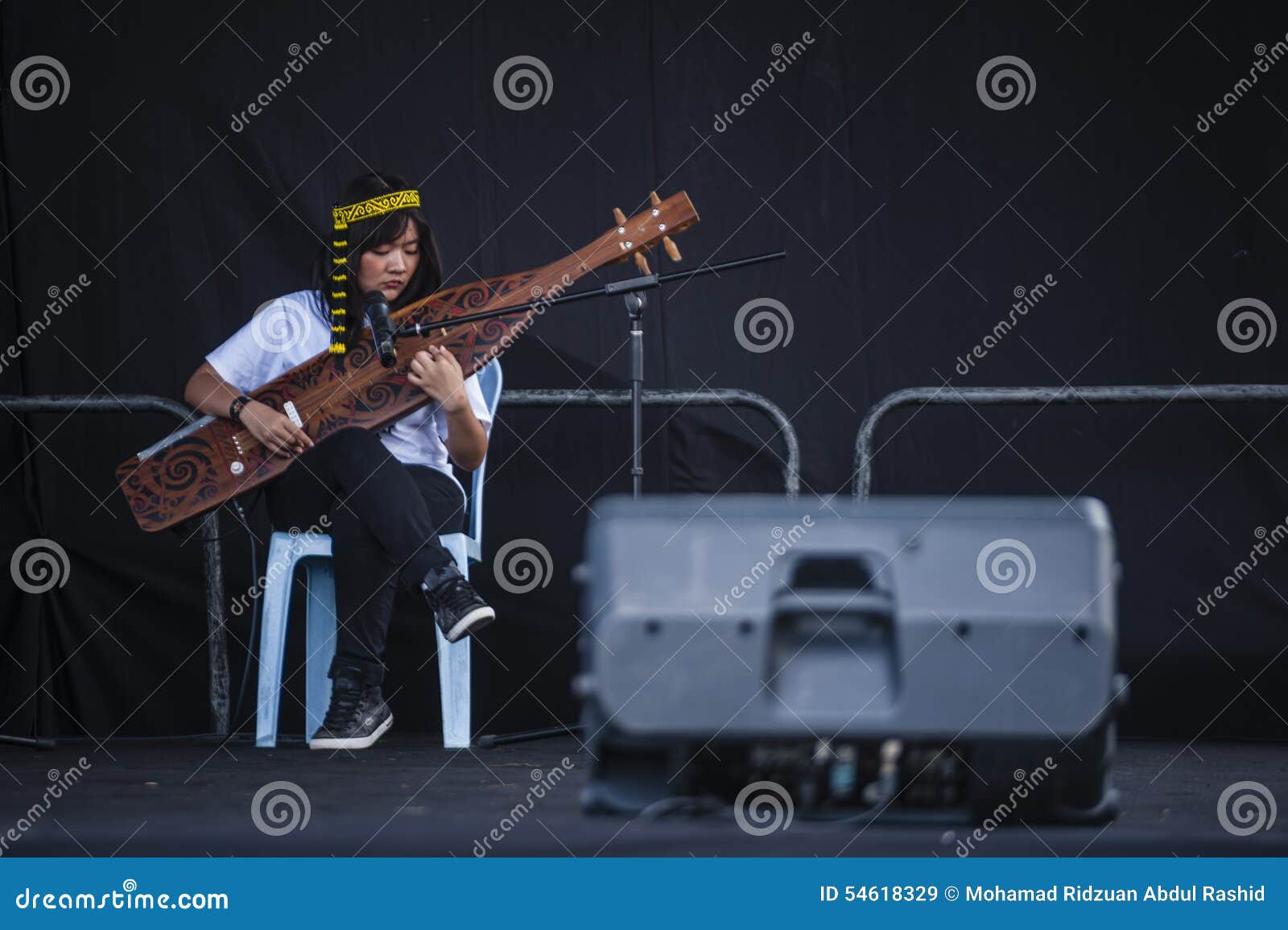 Playing Sapeh editorial stock image. Image of sounds - 54618329