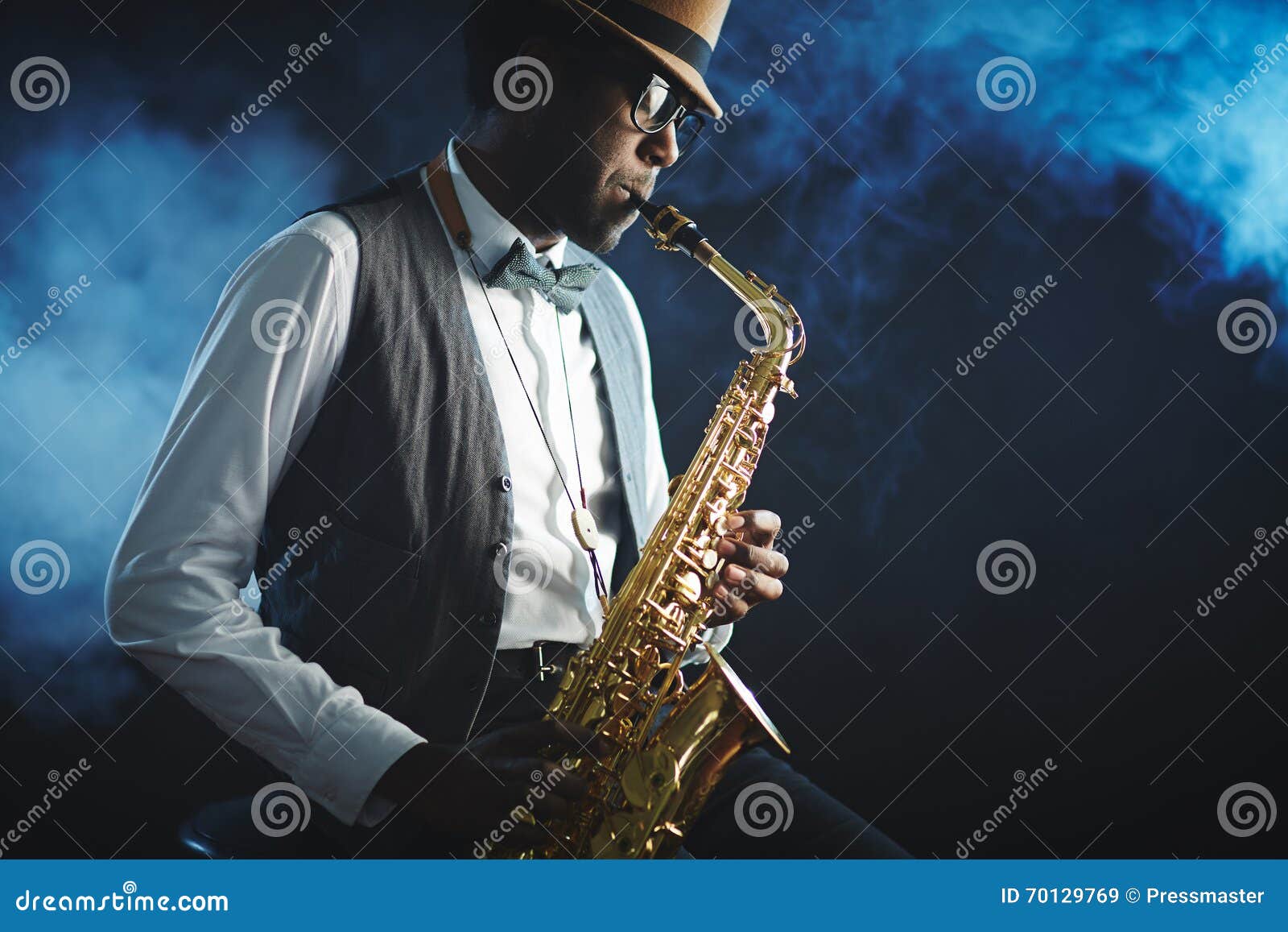 Playing sax stock image. Image of welldressed, instrument - 70129769