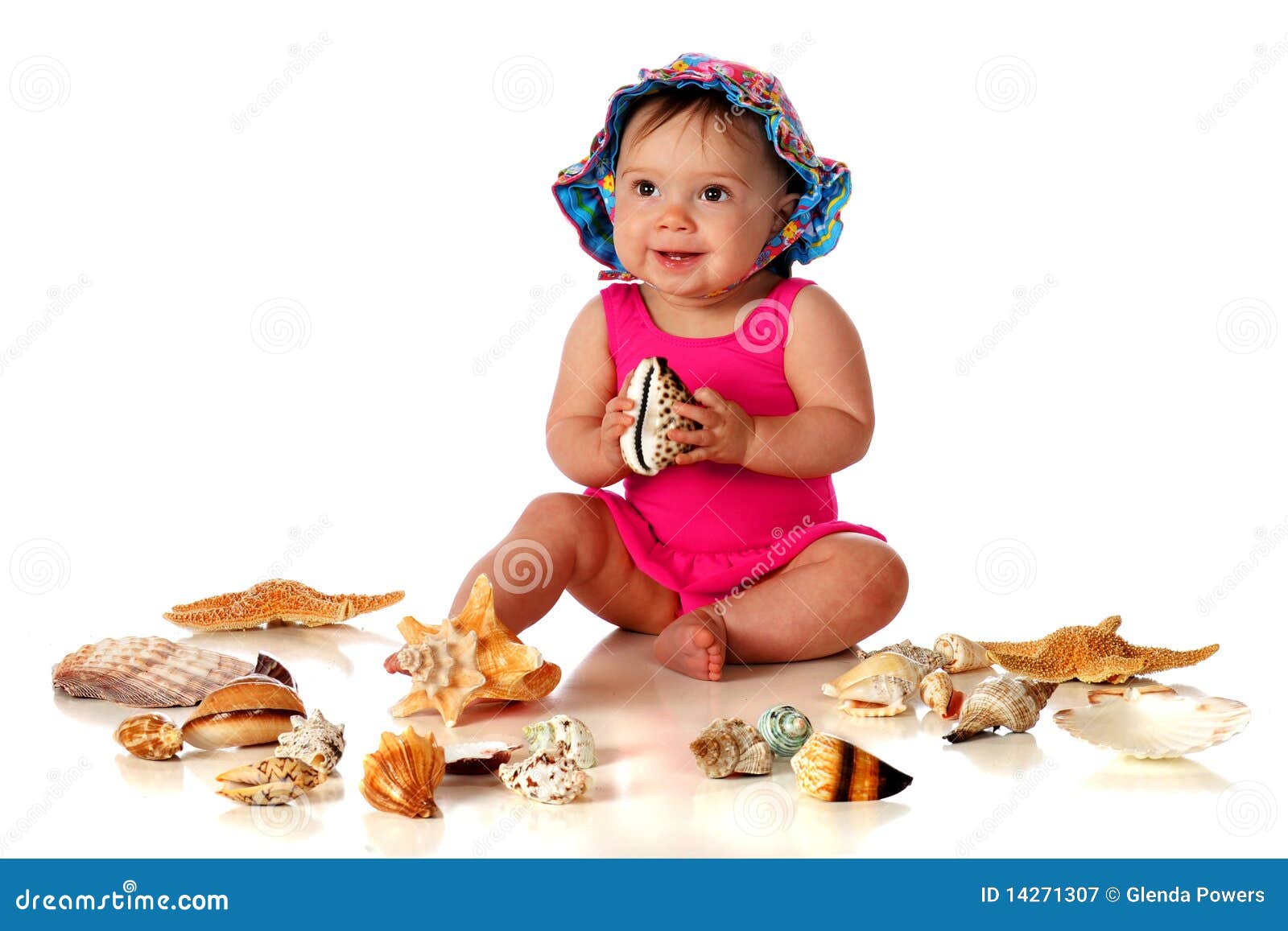 Playing with Shells stock image. Image of swim, smile - 14271307