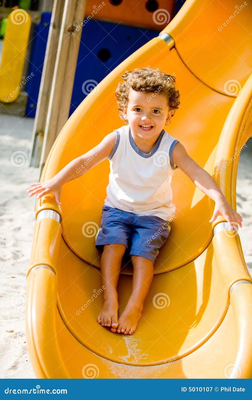 Playing on Slide stock image. Image of active, curly, summer - 5010107