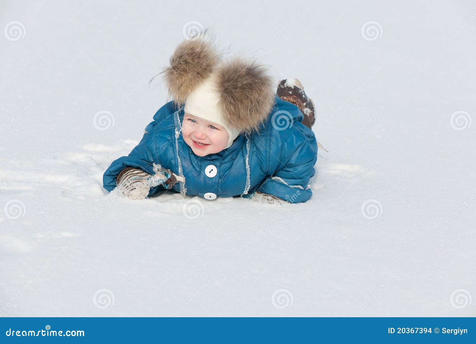 Playing in the snow field stock photo. Image of family - 20367394