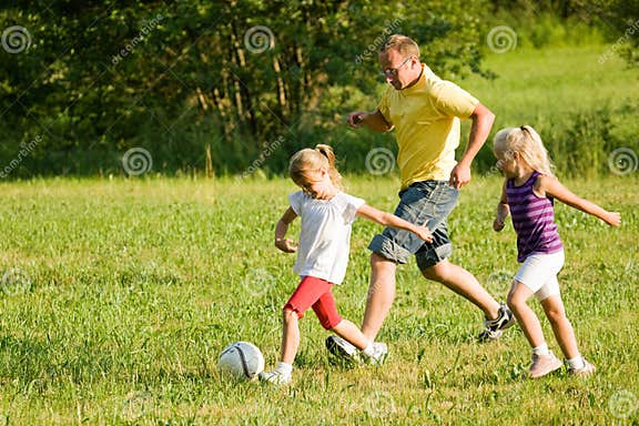 Playing soccer stock photo. Image of soccer, play, family - 5739864