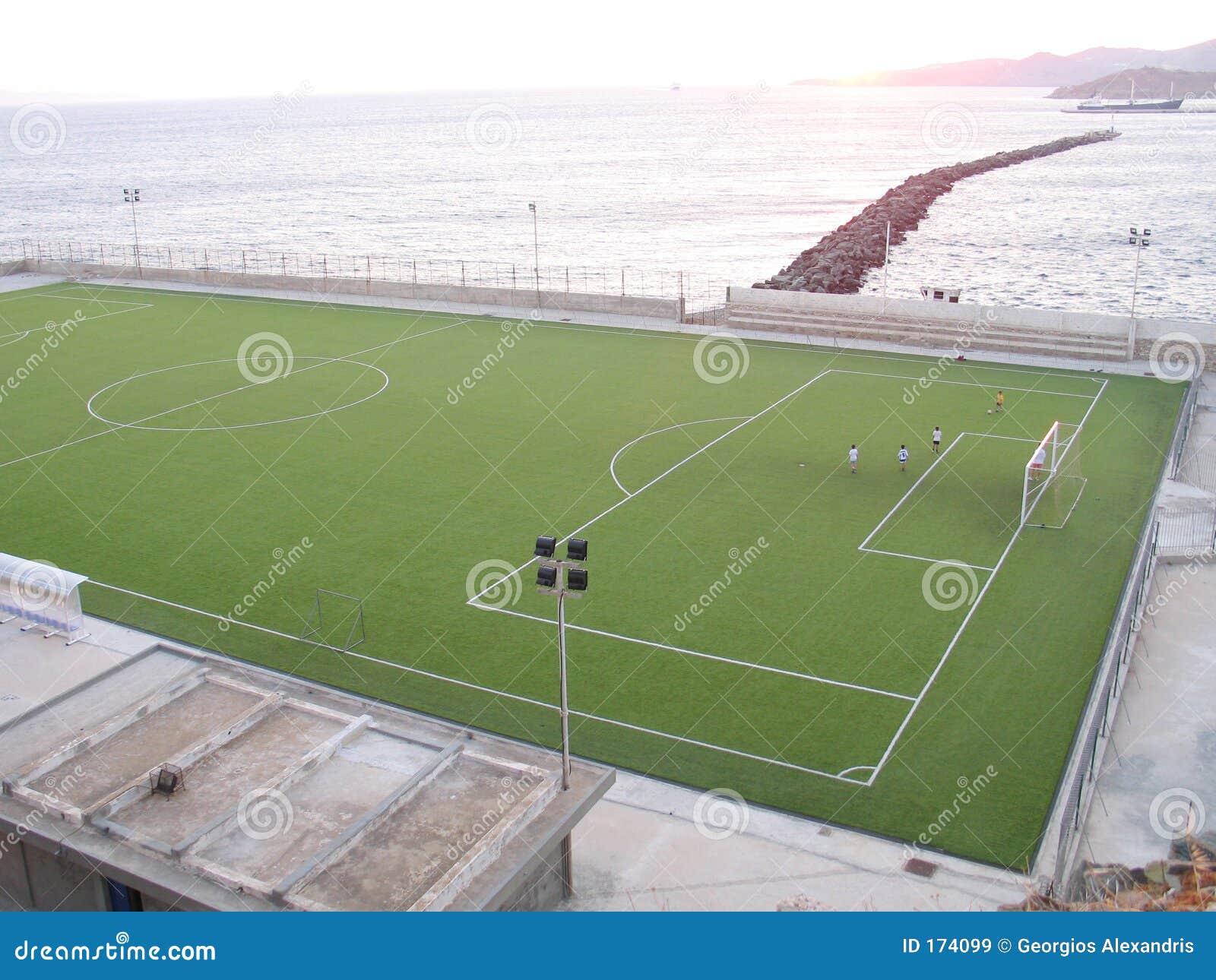 Playing Soccer by the Sea stock image. Image of football - 174099