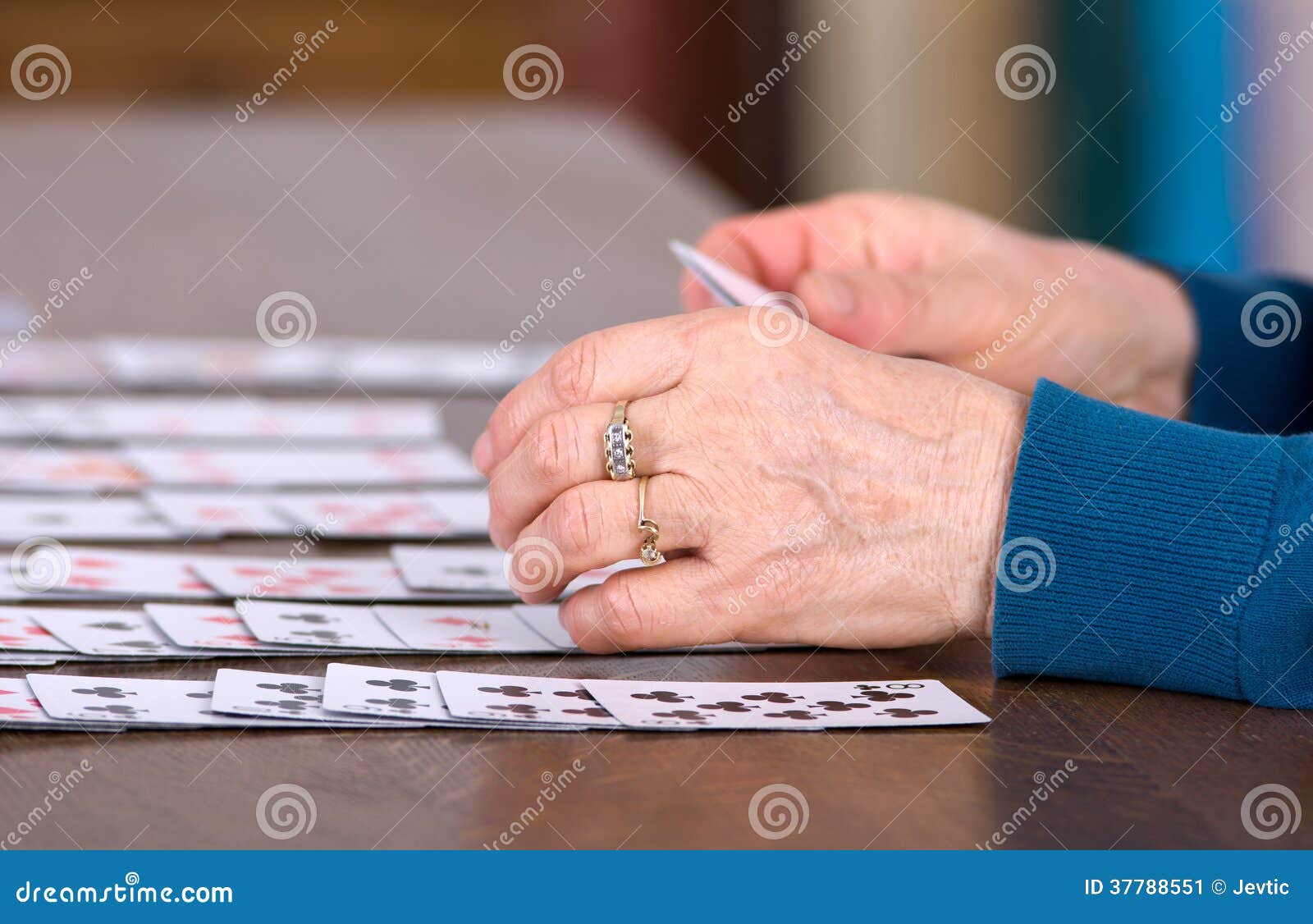 Playing solitaire stock image. Image of adult, pension - 37788551