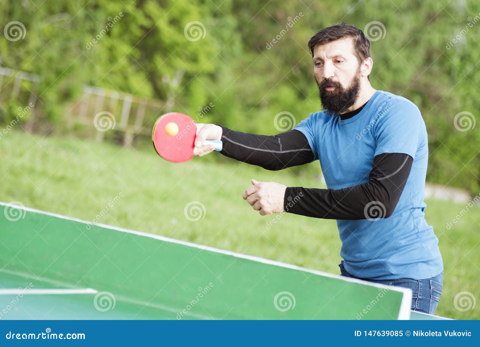 Playing Table Tennis Outdoors Stock Image - Image of lifestyle, player ...