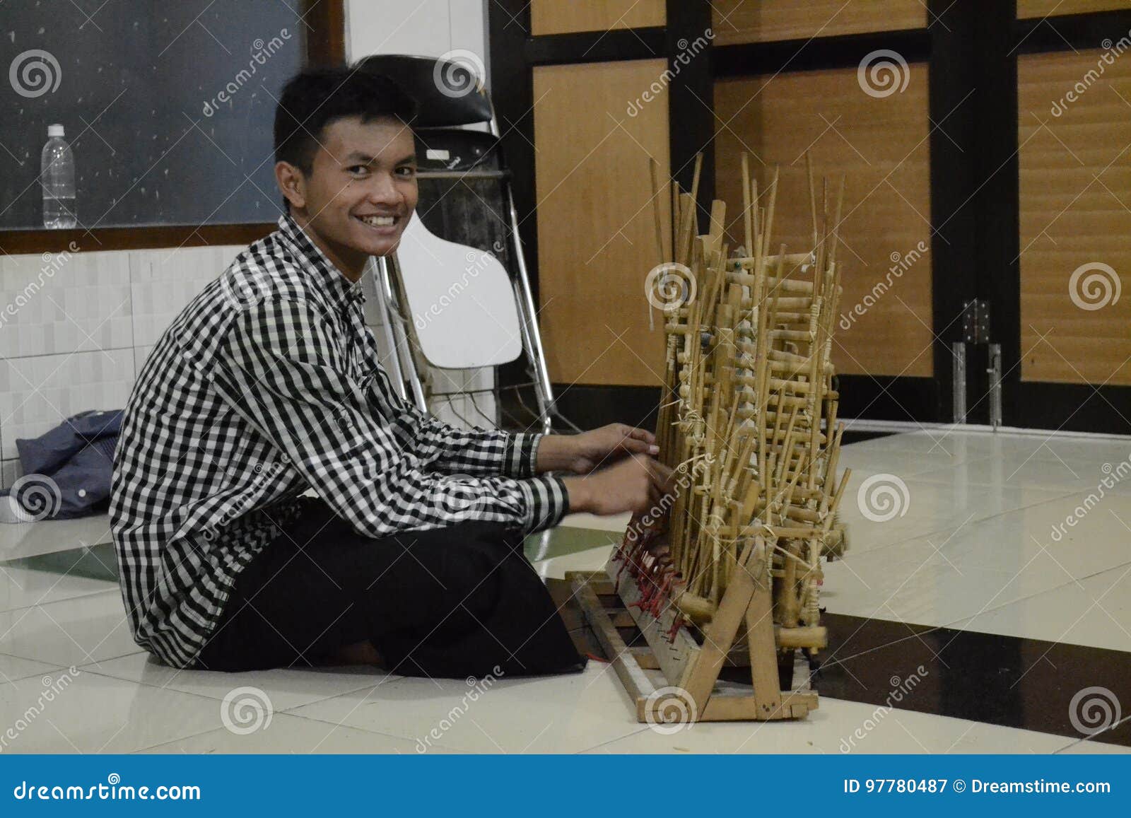 Playing traditional tools editorial photography. Image of jumping ...