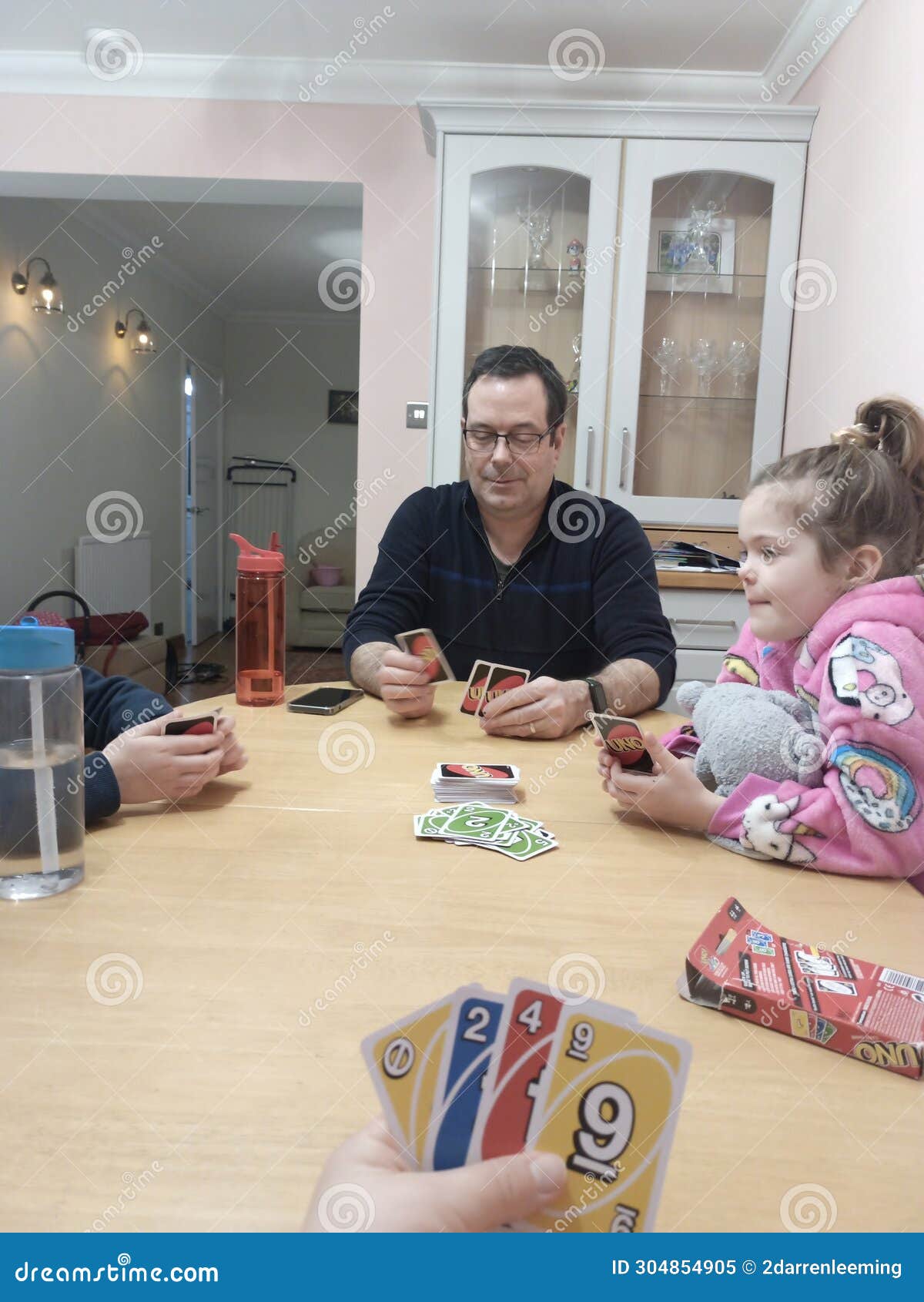 Playing Uno Card Game Family UK Editorial Image - Image of game, family ...