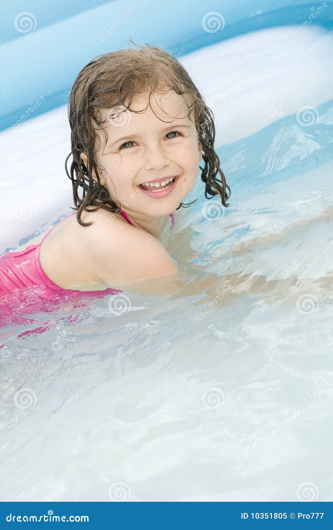 Playing in water stock image. Image of expression, smiling - 10351805