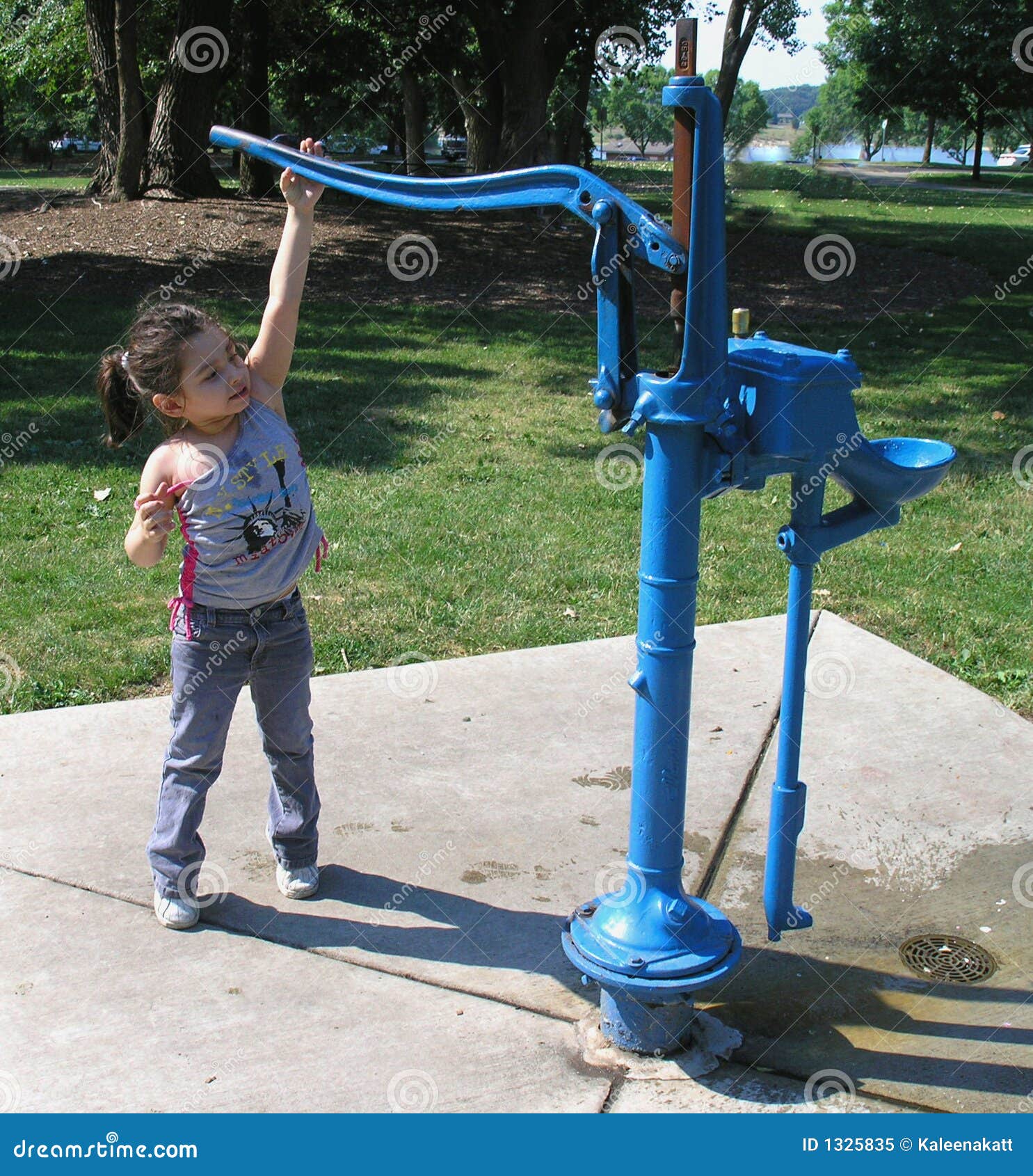 Playing at the Water Pump stock image. Image of water - 1325835