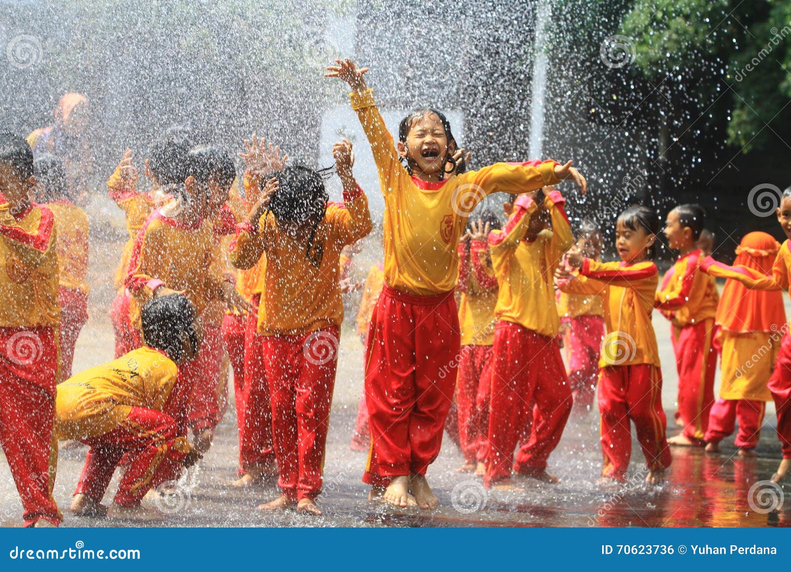 Playing Water Spray Fire editorial photo. Image of play - 70623736