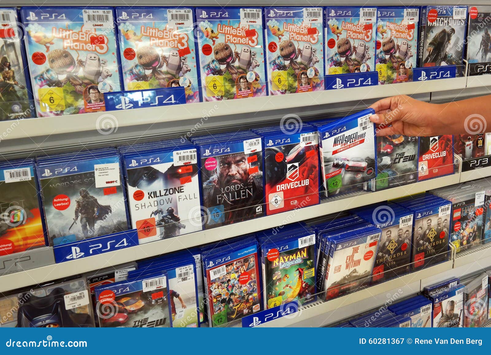 PlayStation 4 giochi fotografia editoriale. Immagine di compatto - 60281367 PlayStation 4 giochi fotografia editoriale. Immagine di compatto - 60281367