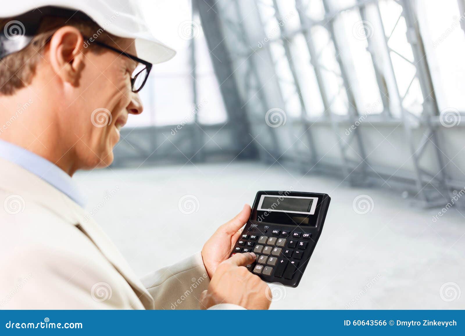 Pleasant Architect Holding Calculator Stock Photo - Image of effect ...