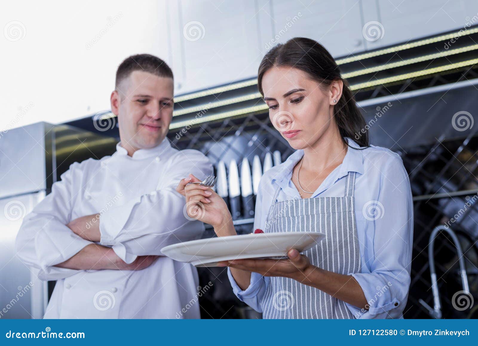 Pleasant Chef and Young Cook Trying a Dessert Stock Photo - Image of ...