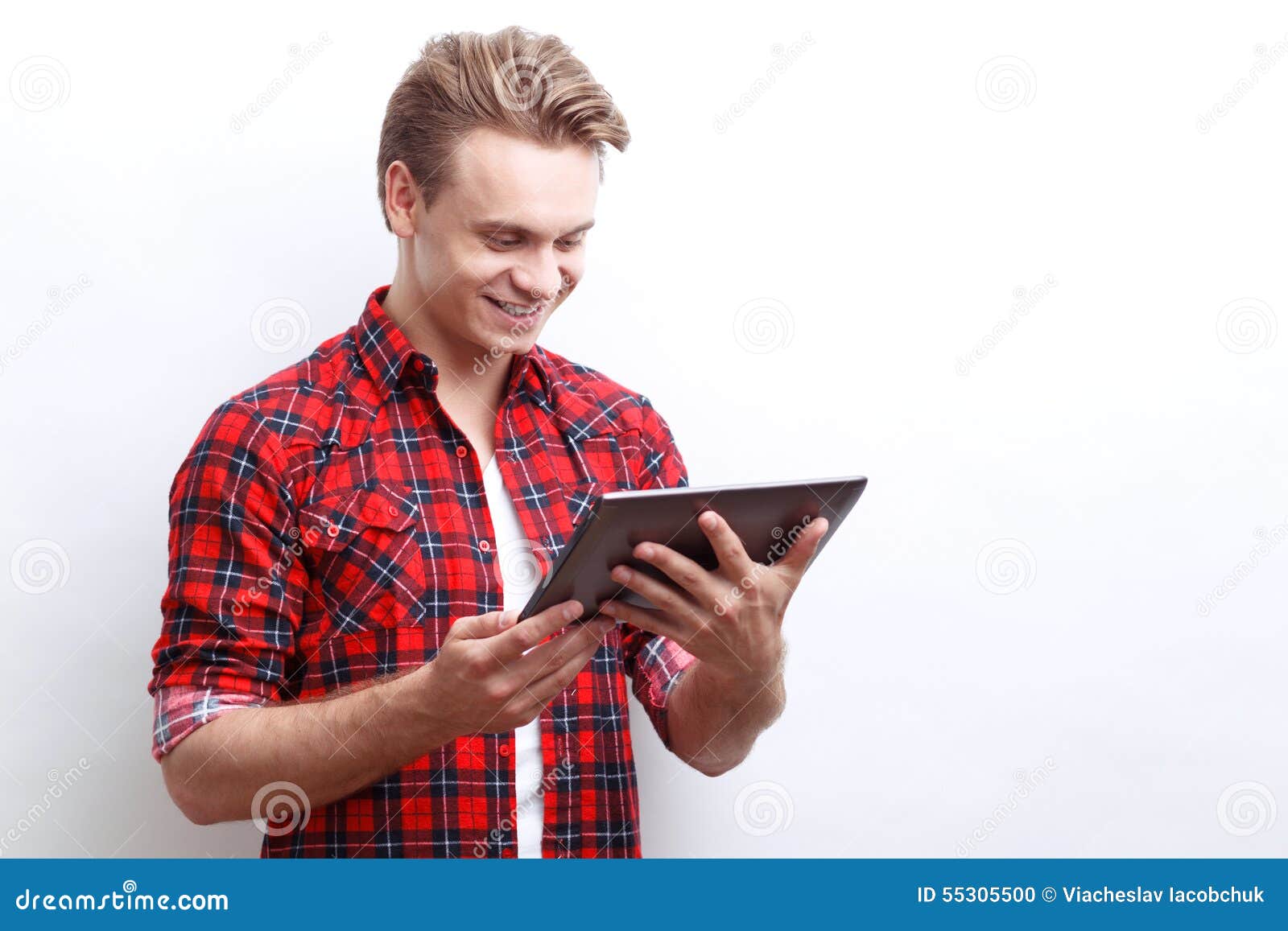 Pleasant Guy Surfing through the Internet Stock Photo - Image of ...