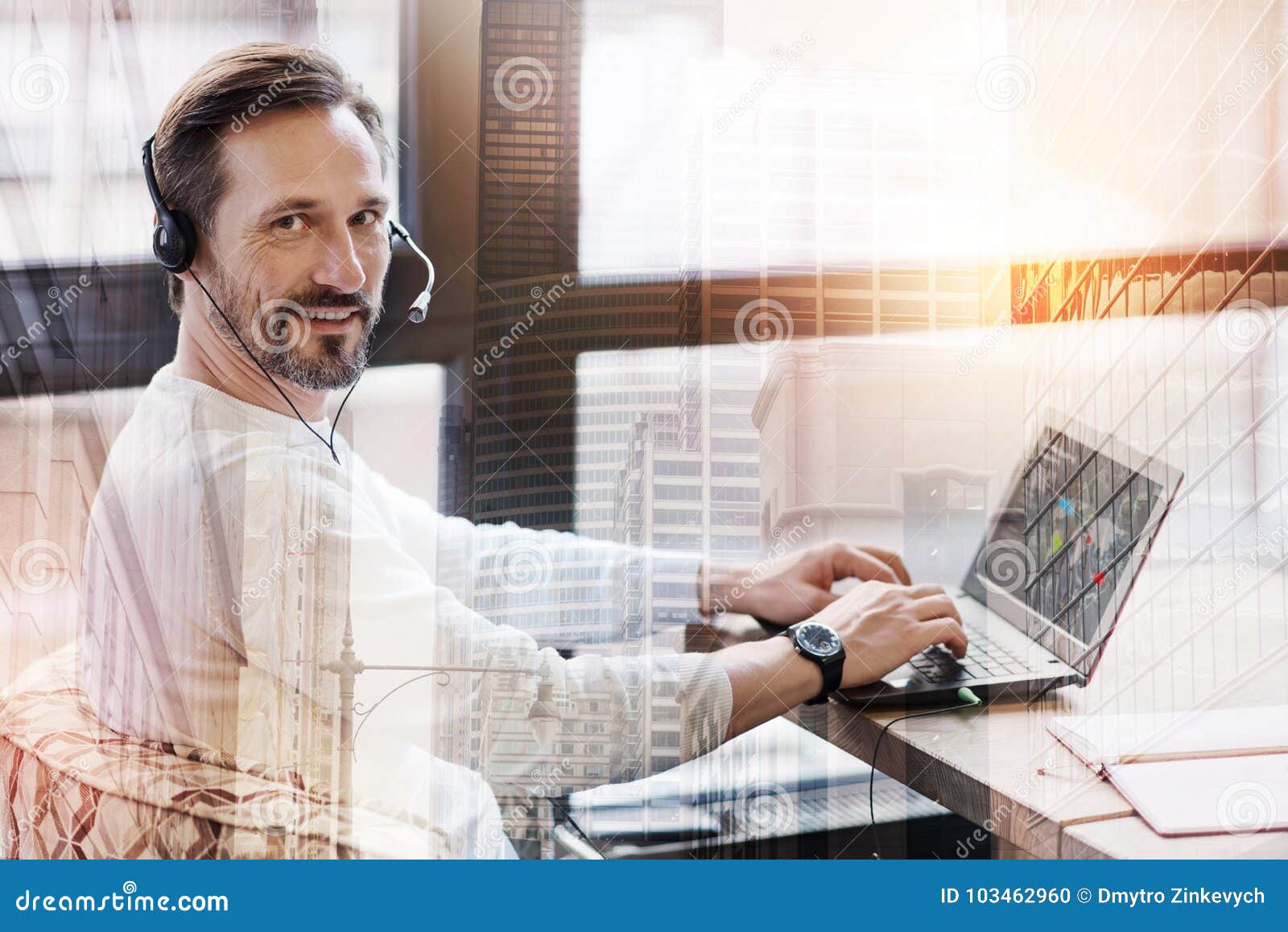 Pleasant Man in Headset Posing while Creating a Presentation Stock ...