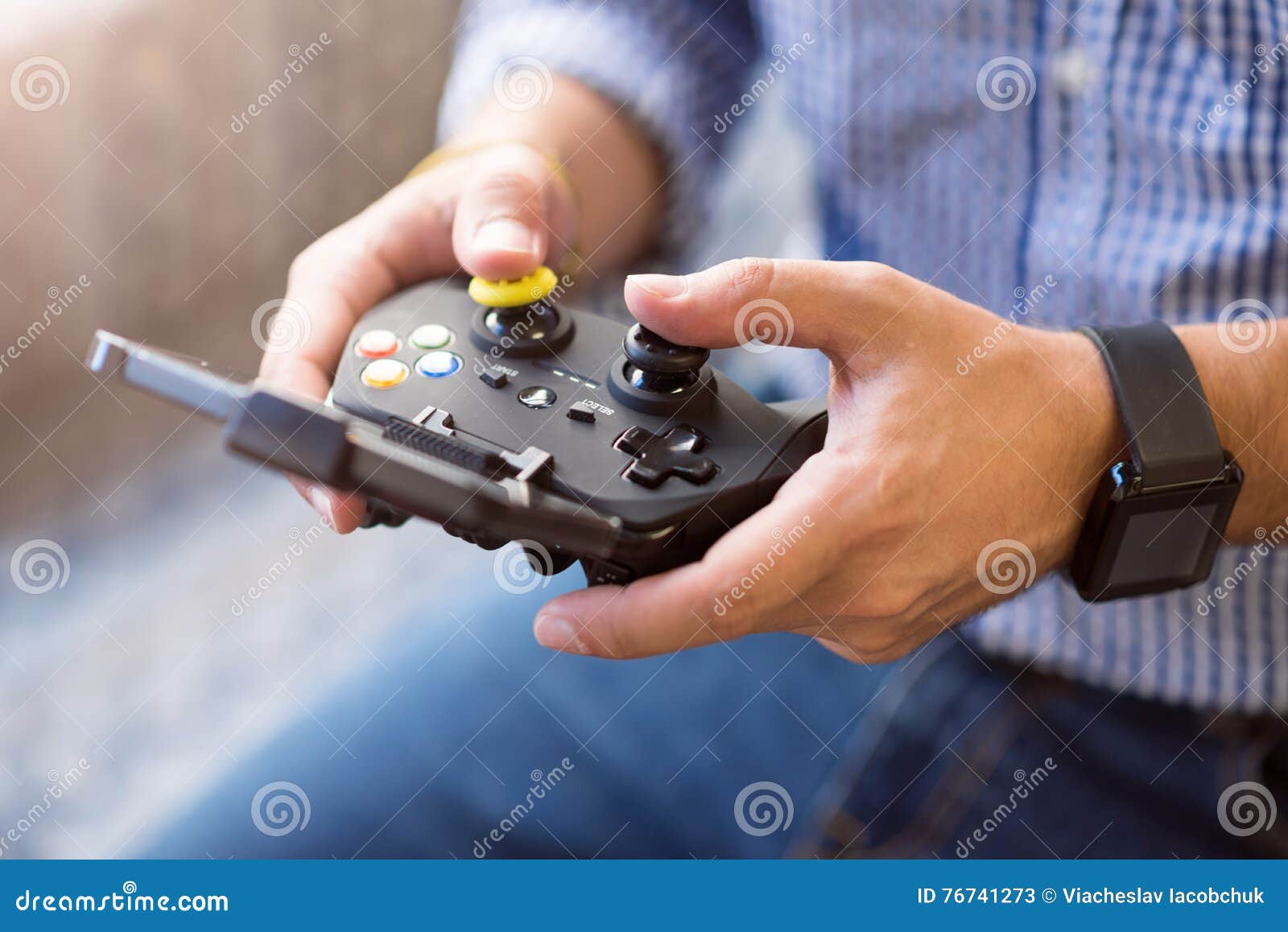 Pleasant Man Holding Game Console Stock Image - Image of light ...