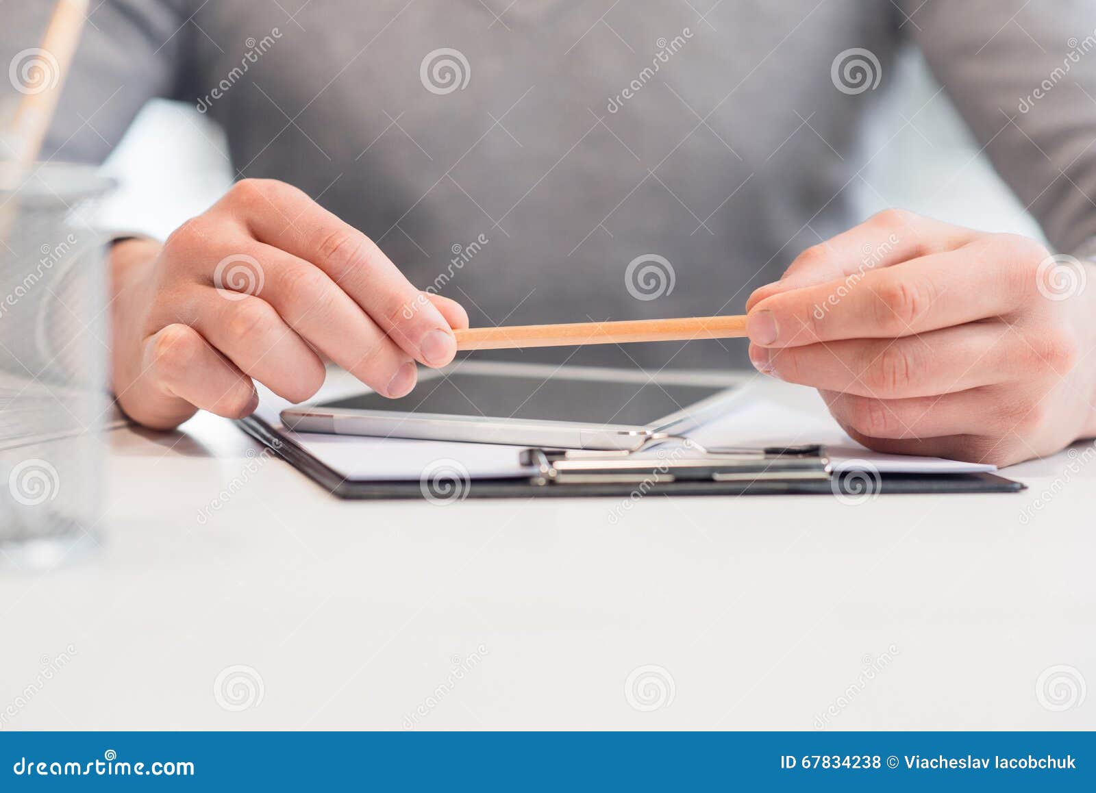 Pleasant Man Holding Pencil Stock Photo - Image of digital, think: 67834238