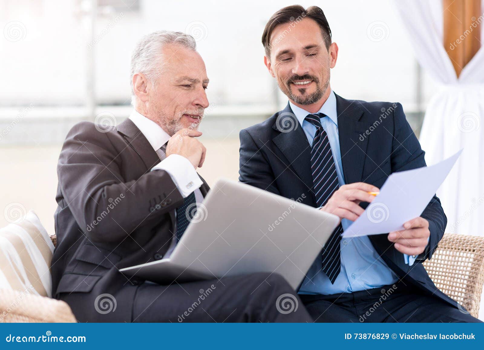 Pleasant Professional Colleagues Sitting on the Couch Stock Image ...