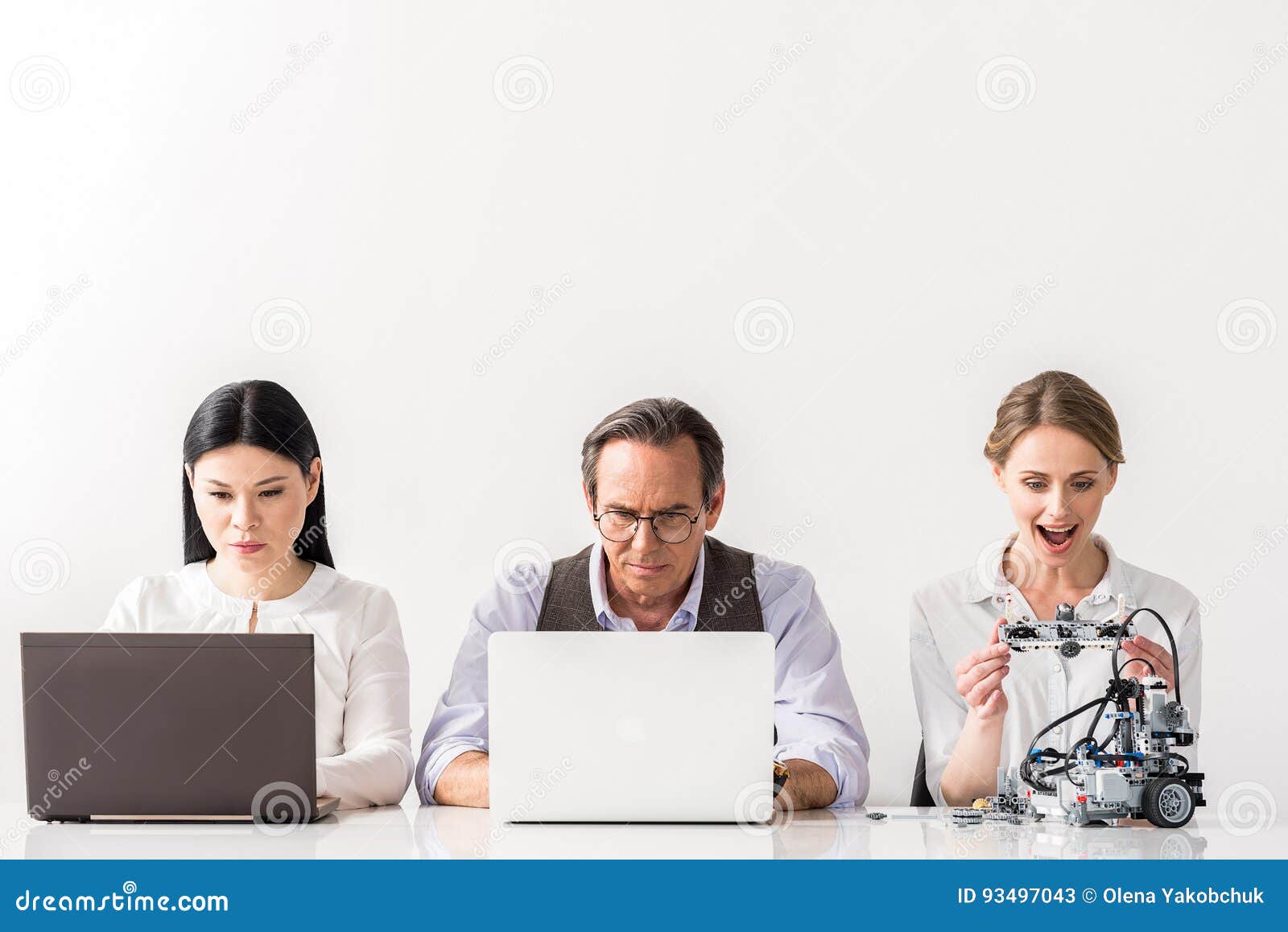 Pleasant Professional Engineers Sitting at Table Stock Image - Image of ...