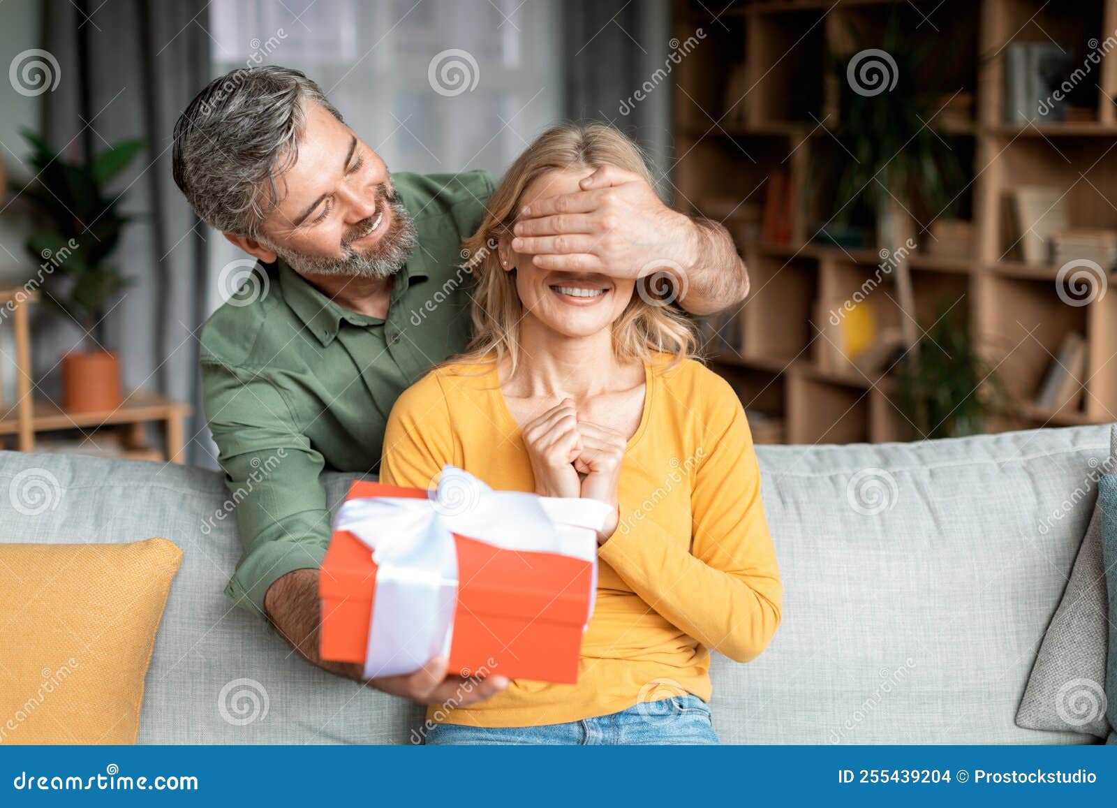 Pleasant Surprise Loving Middle Aged Man Covering Wife S Eyes And