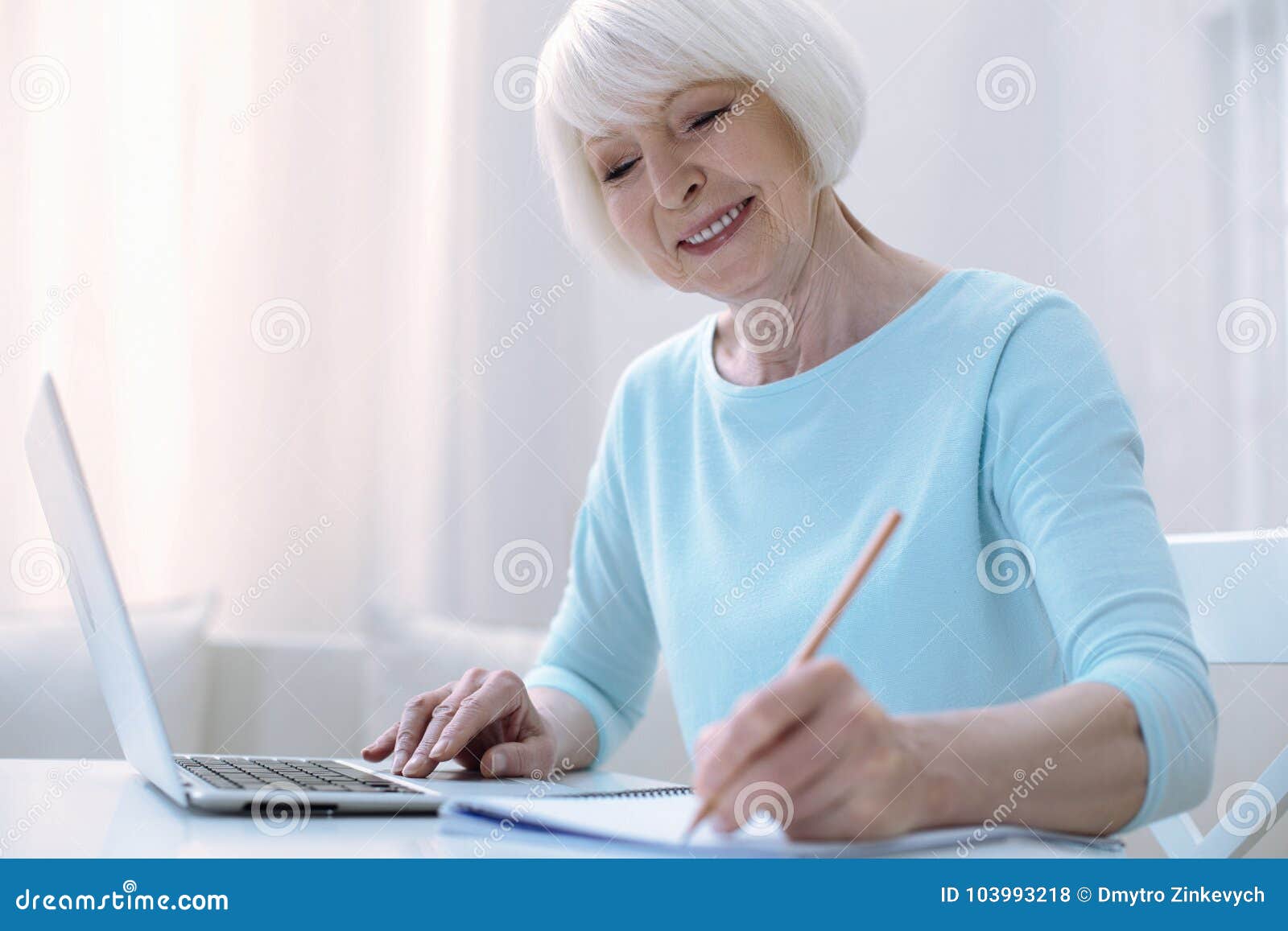 Cute Elderly Woman Working in Her Room Stock Photo - Image of modern ...