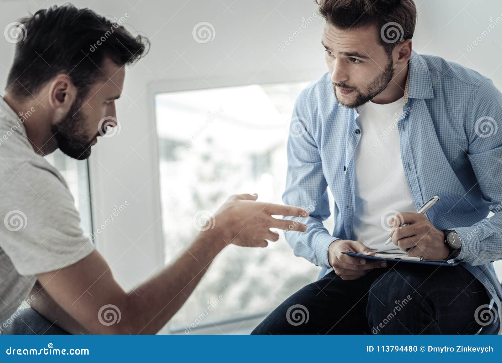 Pleasant Young Man Taking Notes Stock Photo - Image of healthcare ...