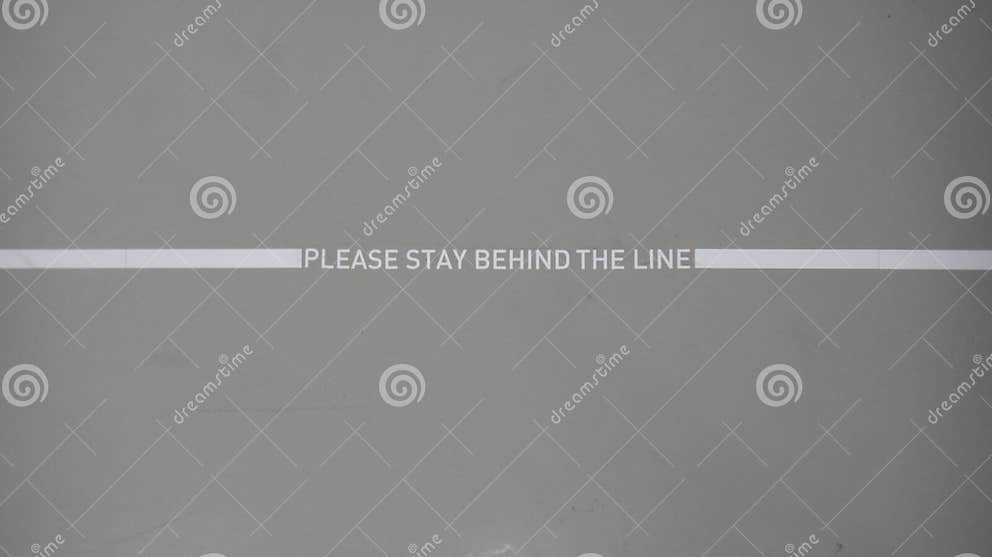 Please Stay Behind the Line Stock Photo - Image of stay, board: 83582996
