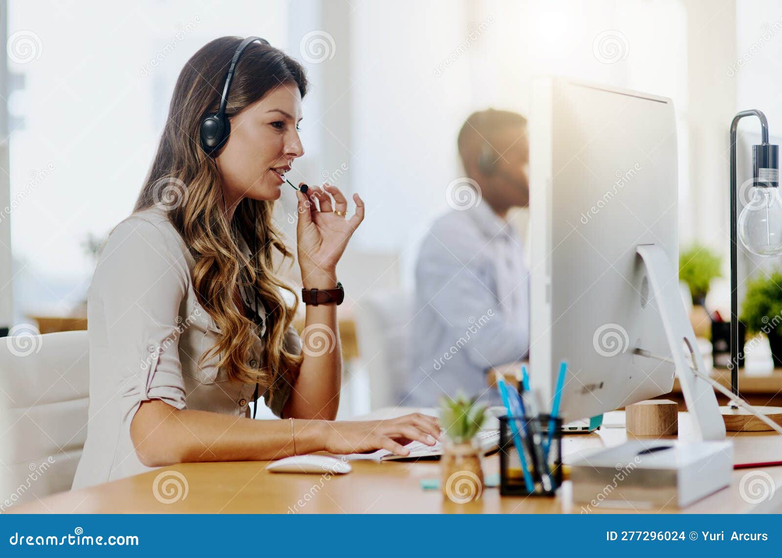 Please Stay on the Line while I Resolve the Problem. a Female Agent ...