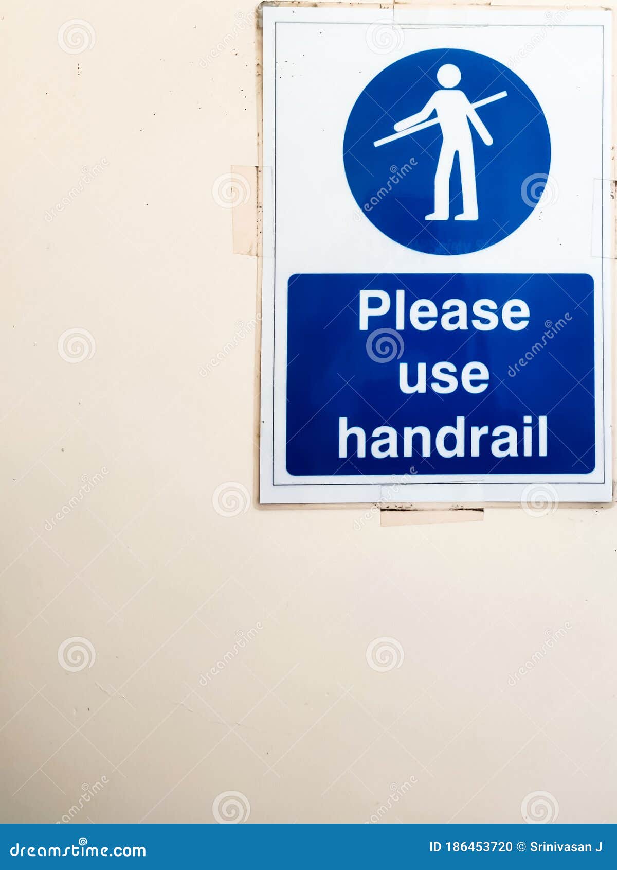 Please Use Handrail Sign Poster on Wall Near Escalator Stock Photo ...