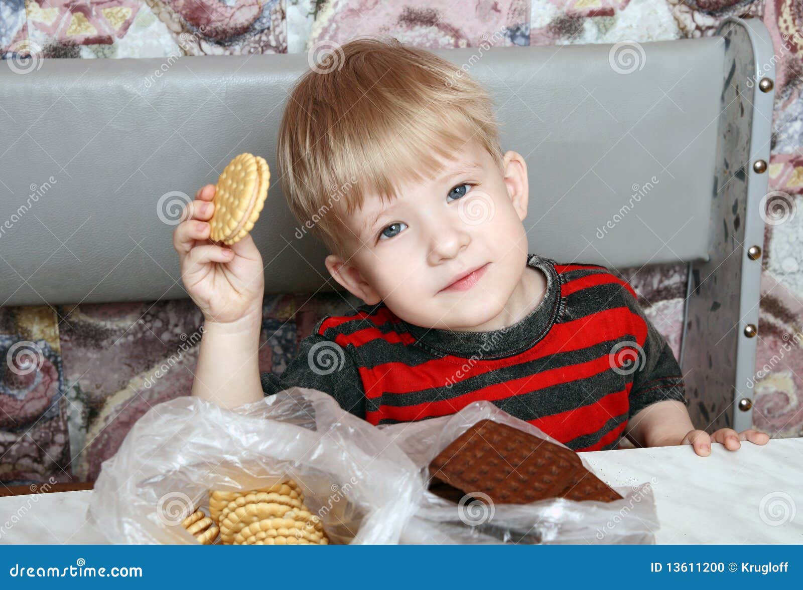 Pleased with the Child with Cookies in Hand Stock Photo - Image of ...