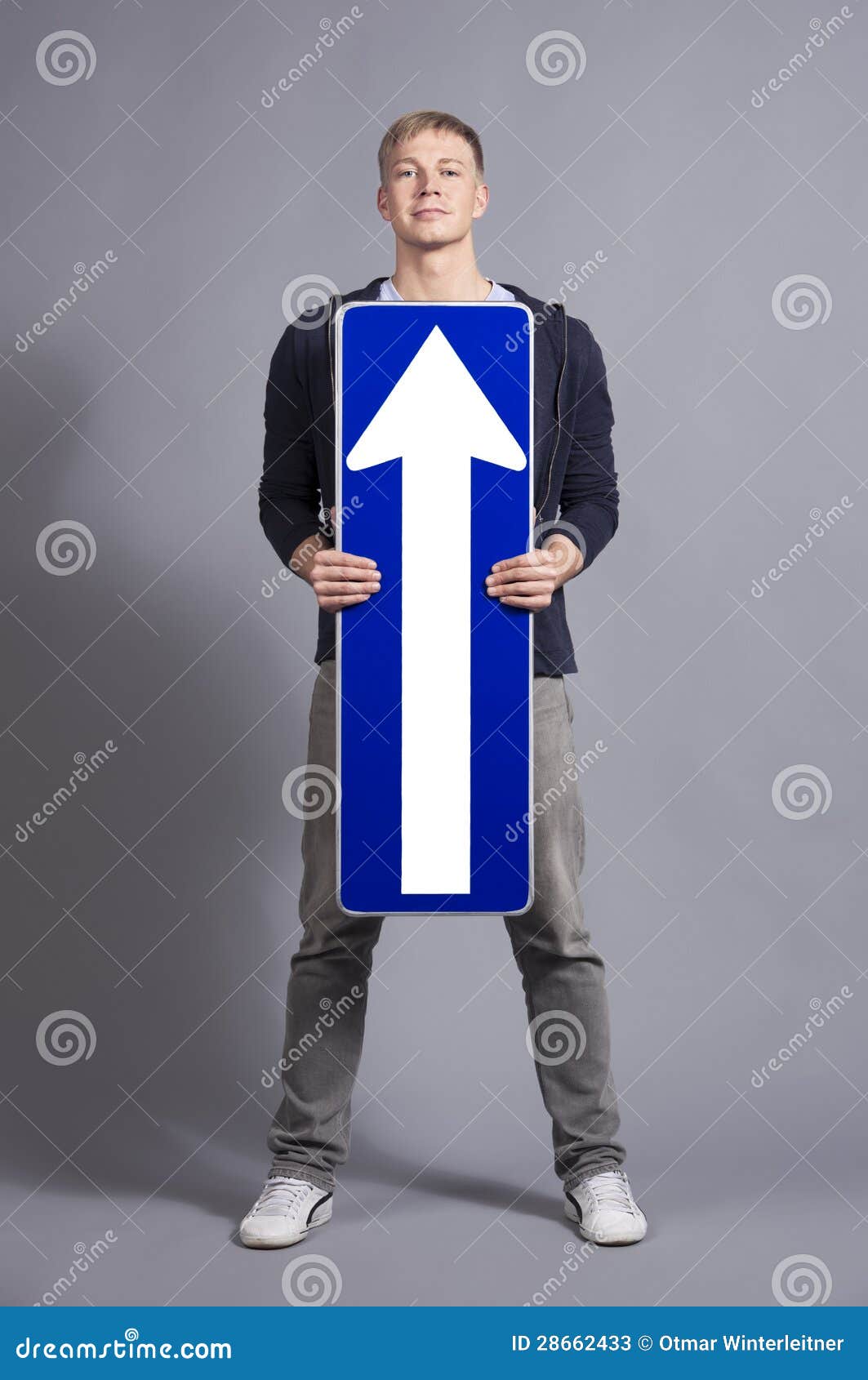 Pleased Man Holding Direction Arrow Sign Pointing Up. Stock Image ...
