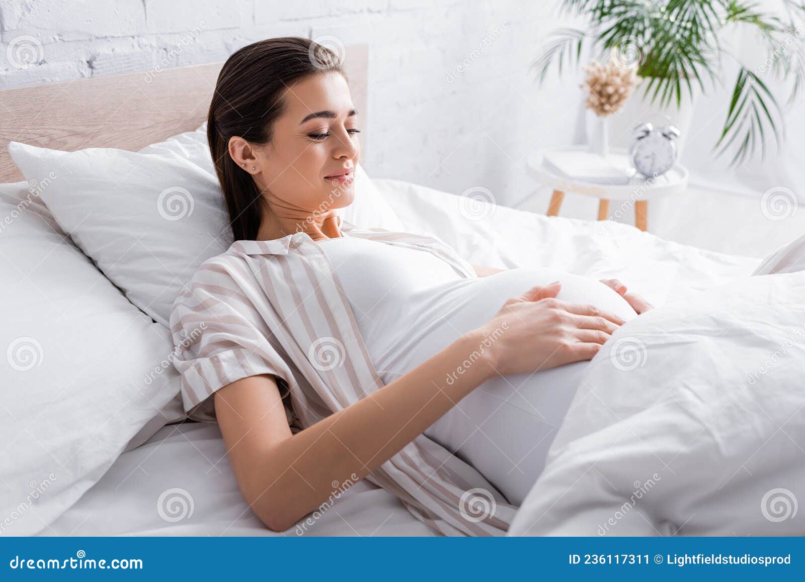 Pleased Pregnant Woman Touching Belly While Stock Image Image Of Blur
