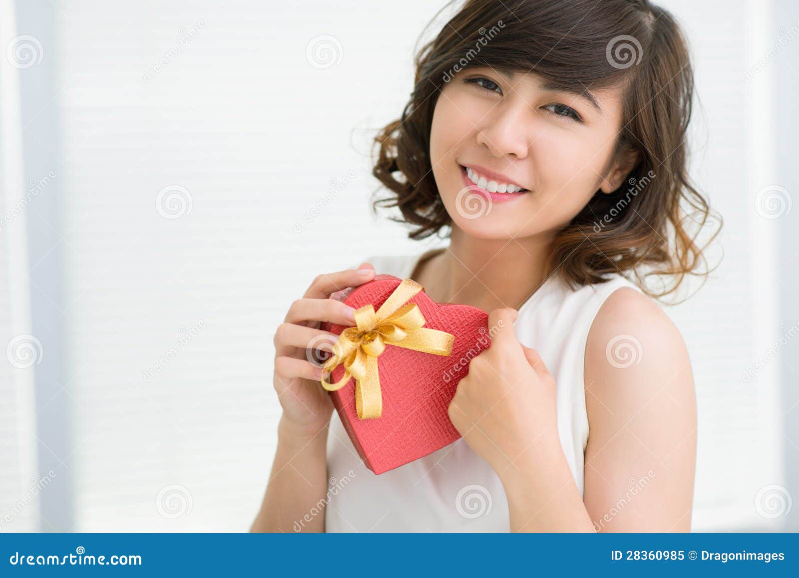 Pleased with present stock image. Image of looking, birthday - 28360985