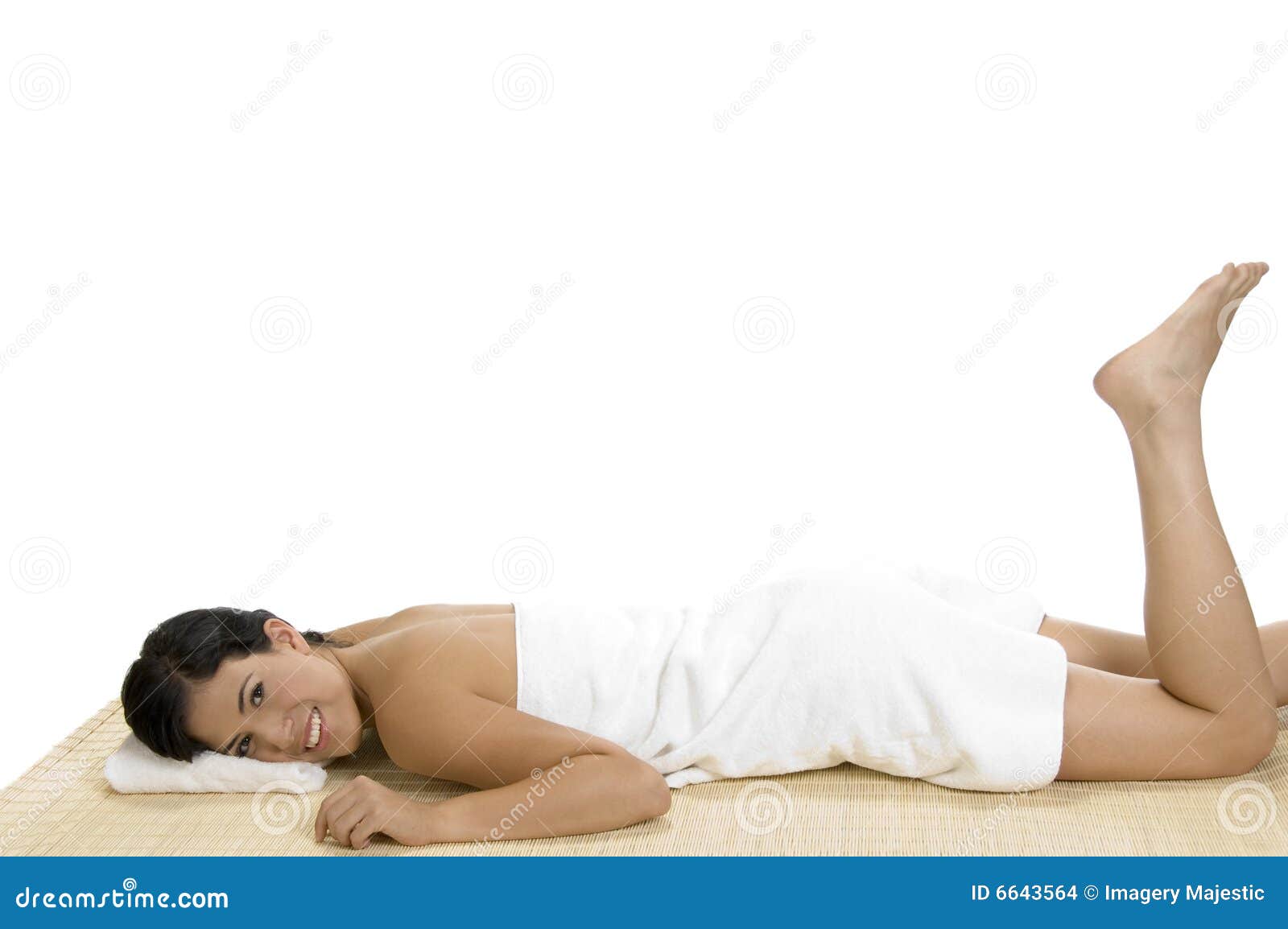 Pleased Woman Laying on Bamboo Mat Stock Photo - Image of american ...