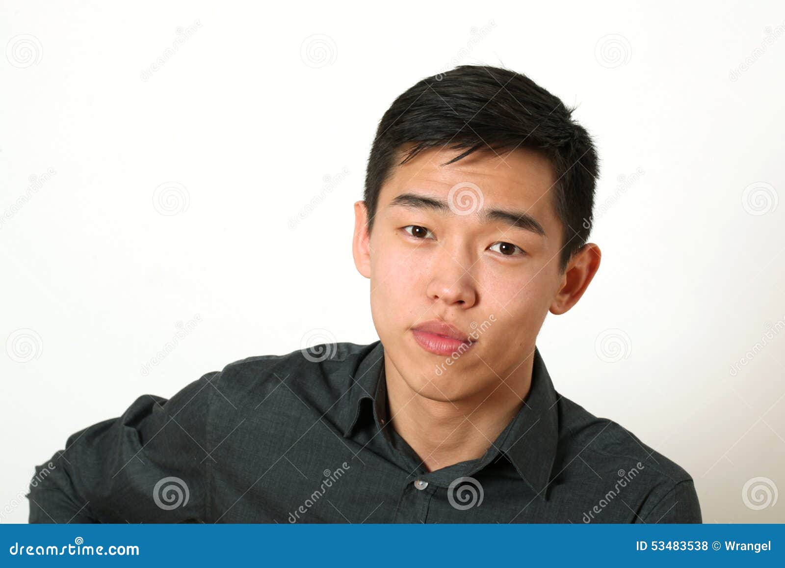 Pleased Young Asian Man Looking at Camera Stock Photo - Image of ...