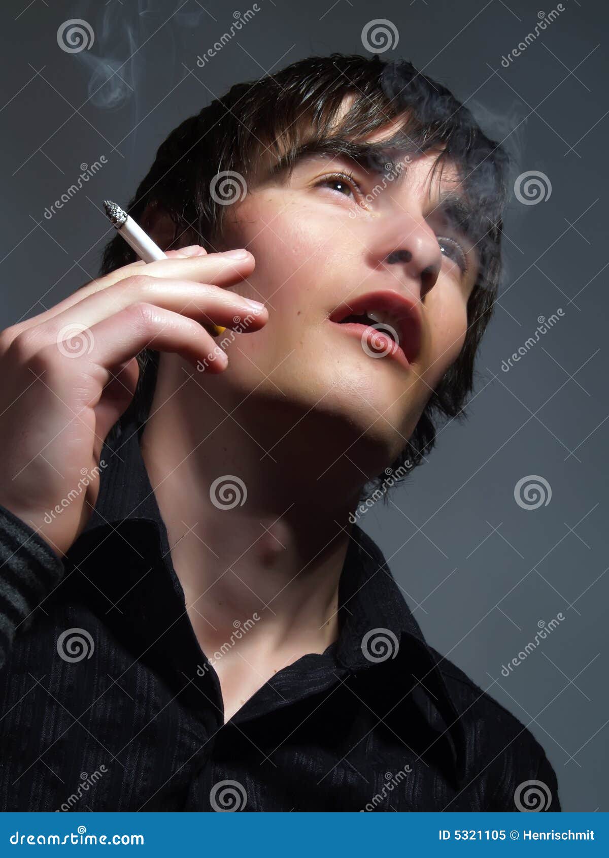 Pleasure of smoking stock image. Image of hairstyle, attractive - 5321105