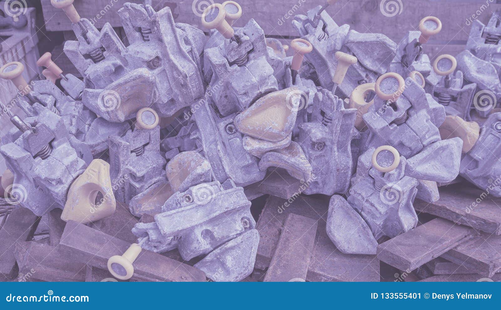 Plenty of Container Twistlocks Lying on a Bunch of Rusty Steel Stoppers ...