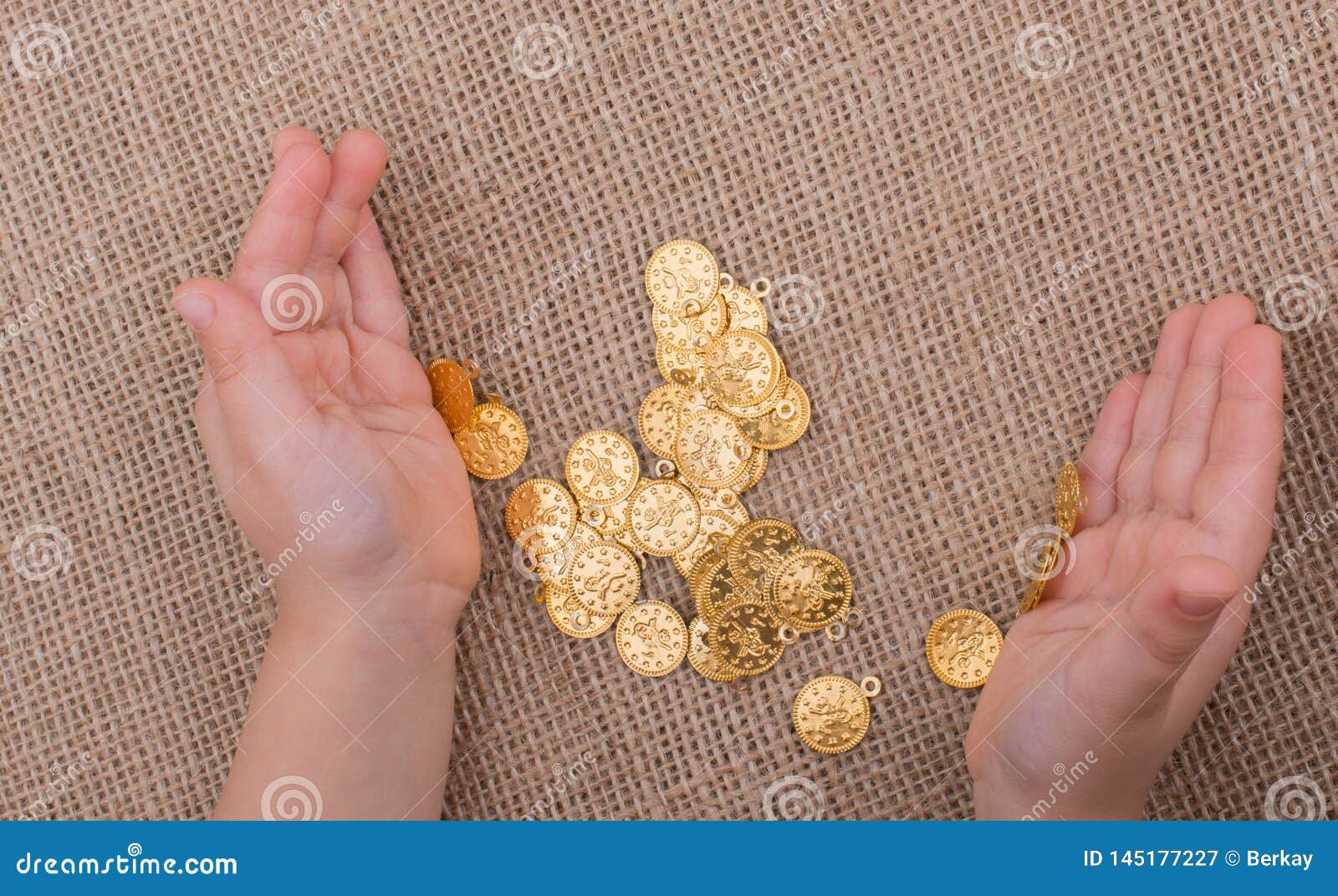 Plenty of Fake Gold Coins in Hand Stock Image - Image of financial ...