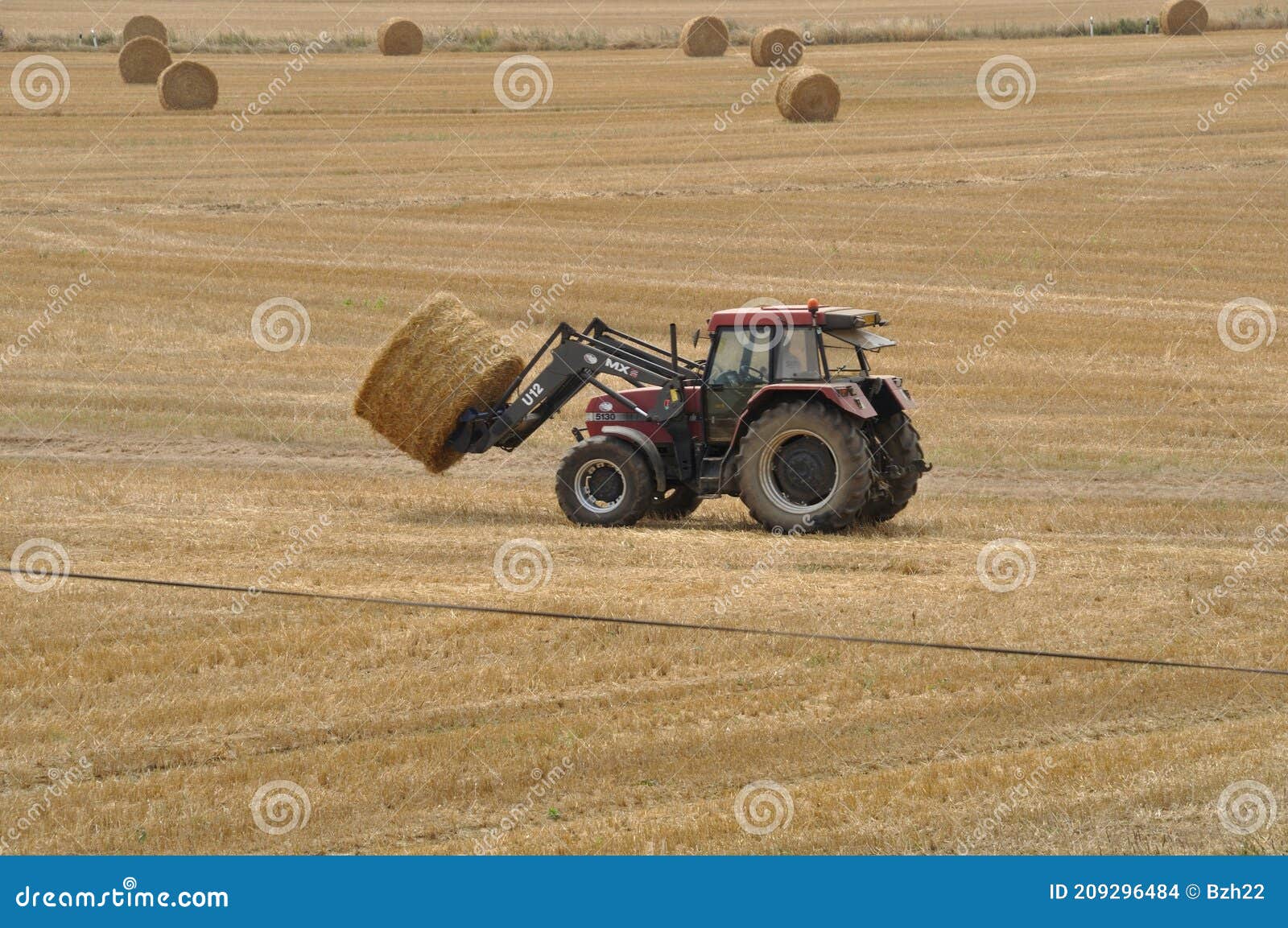 Tractor And Harvester Editorial Photo | CartoonDealer.com #75092803